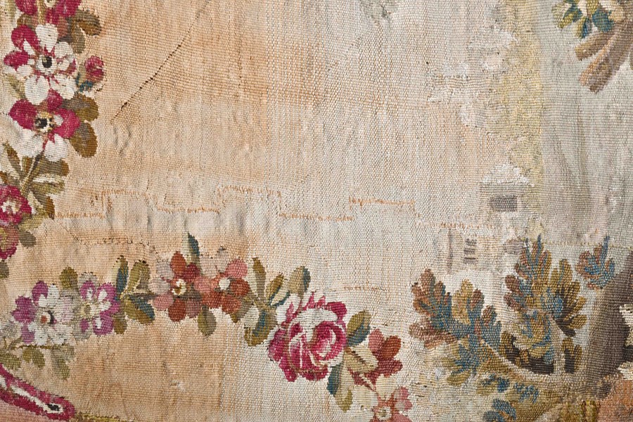 An 18th century style large rectangular tapestry panelhounds pursuing a ...