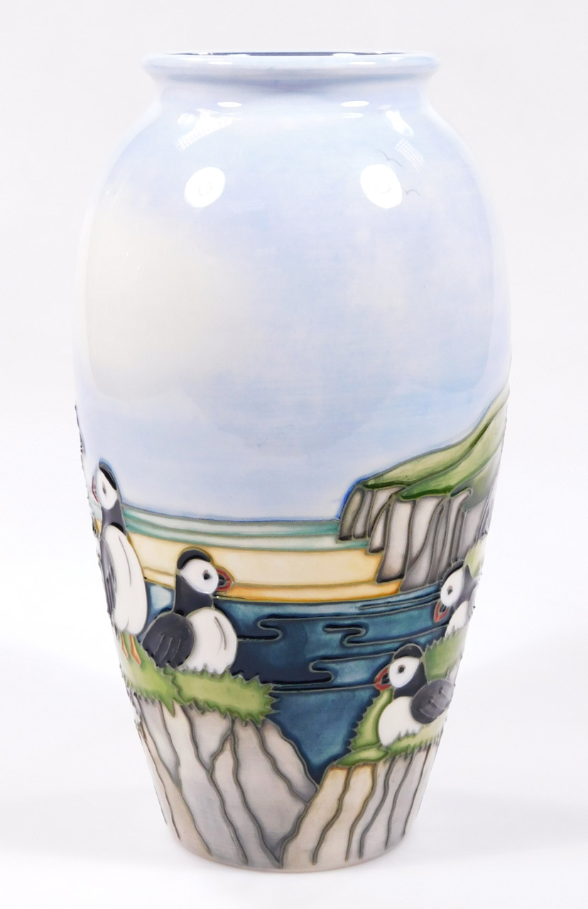 A Moorcroft Puffin pattern vase, decorated by Carol Lovett, tube line ...
