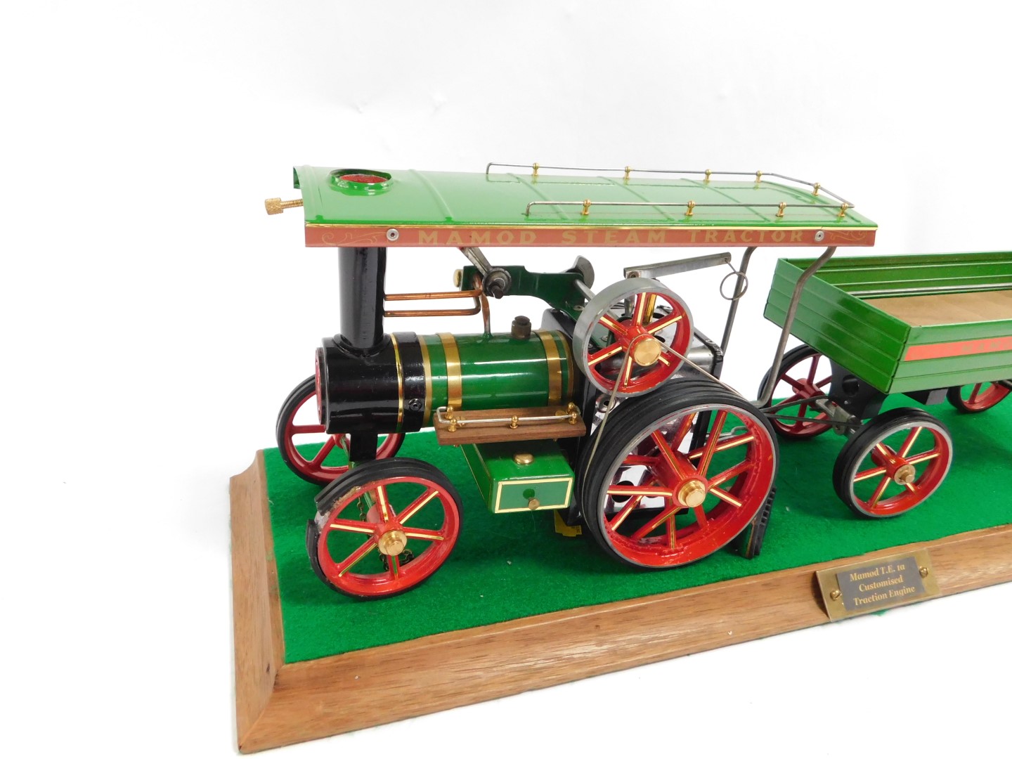 A Mamod TE1A customised traction engine, on a wooden stand with name ...