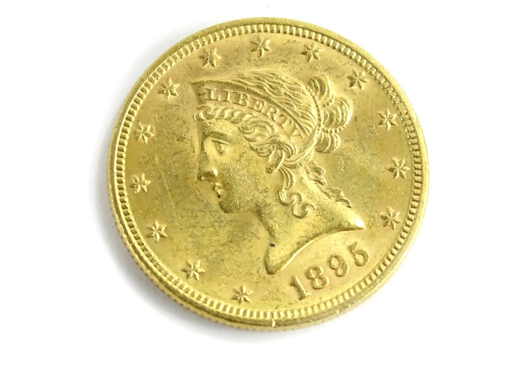 An 1895 American gold 10 dollar coin.