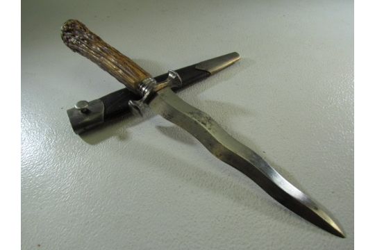 Militaria: A Victorian Scottish Dirk Dagger with rare wavy blade and ...