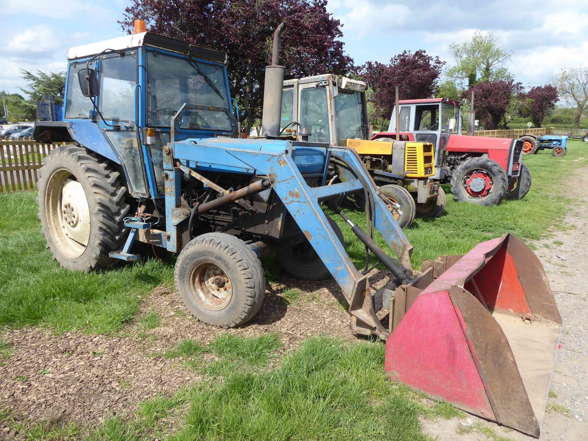 Ford 5610 Agri tractor with cab and loader bucket, 1985