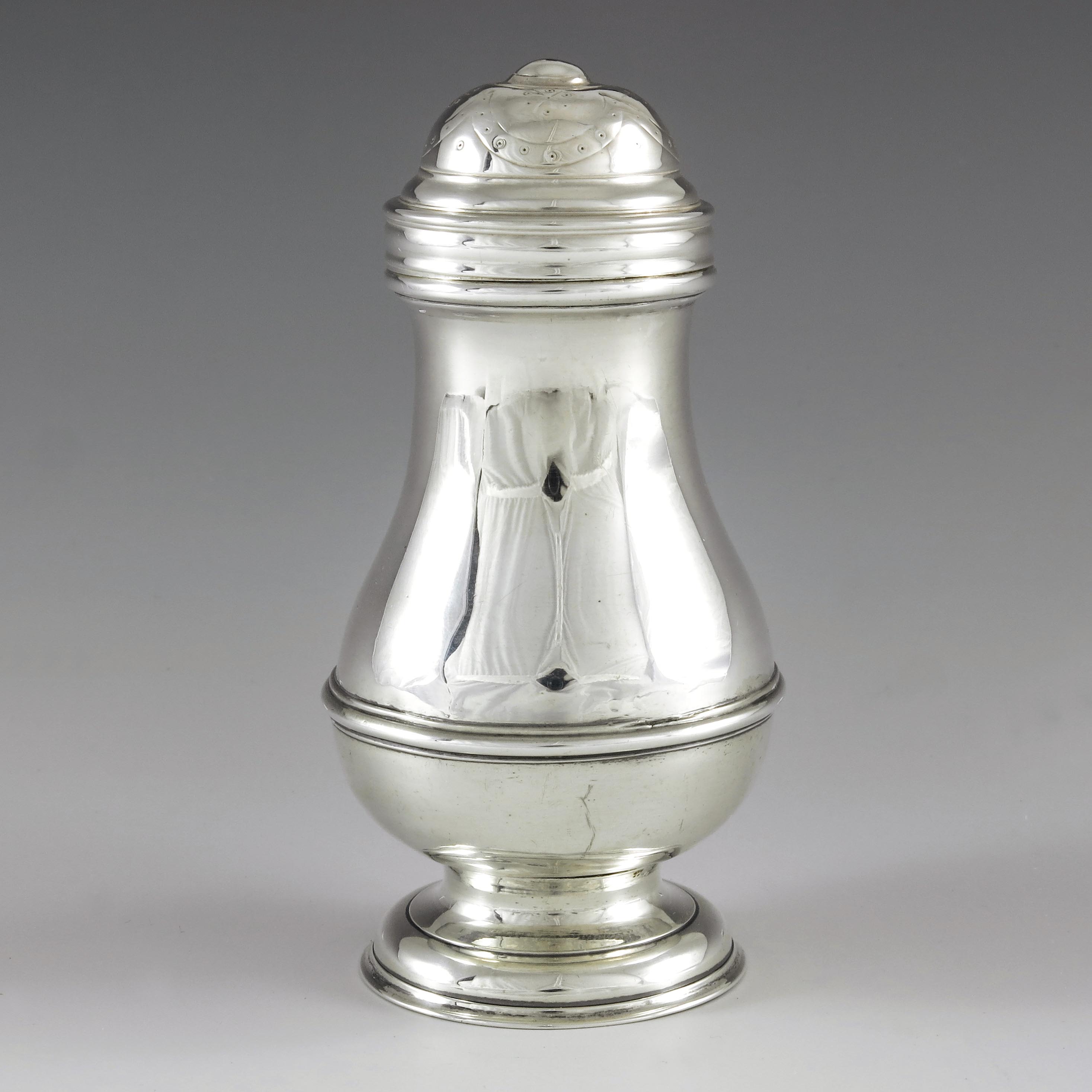 John Gamon, London 1734, a George II silver blind mustard pot, footed ...