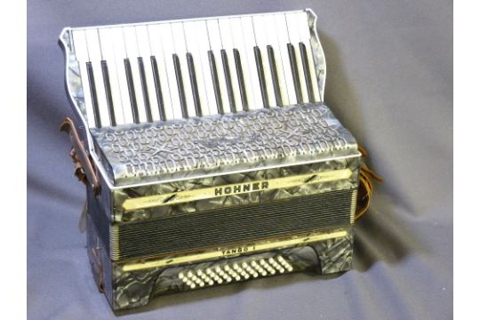 A VINTAGE HOHNER TANGO 1 ACCORDION