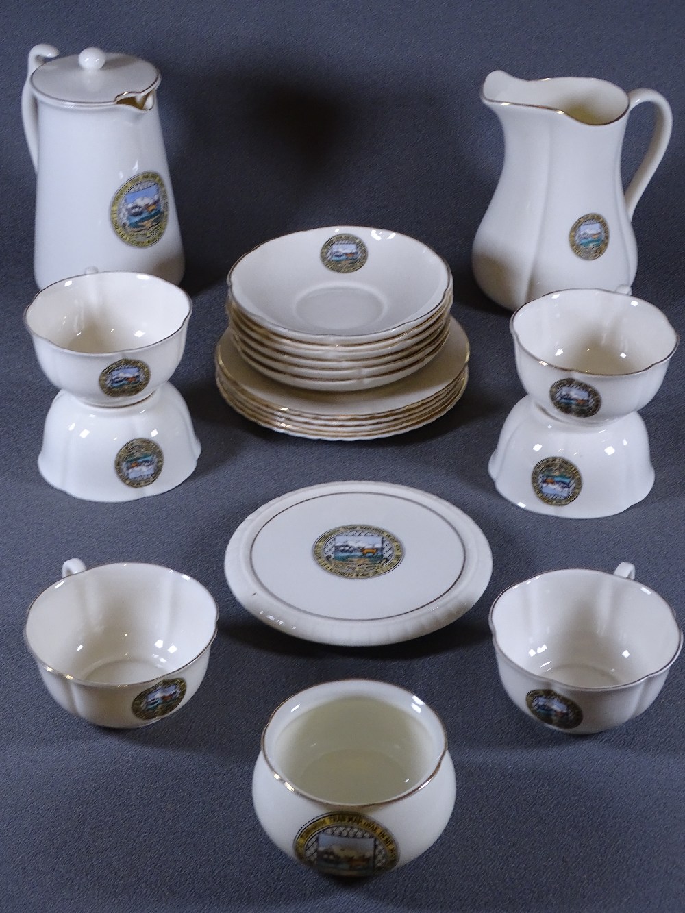 W H GOSS CHINA PART TEA SERVICE with Falkland Islands crest comprising ...