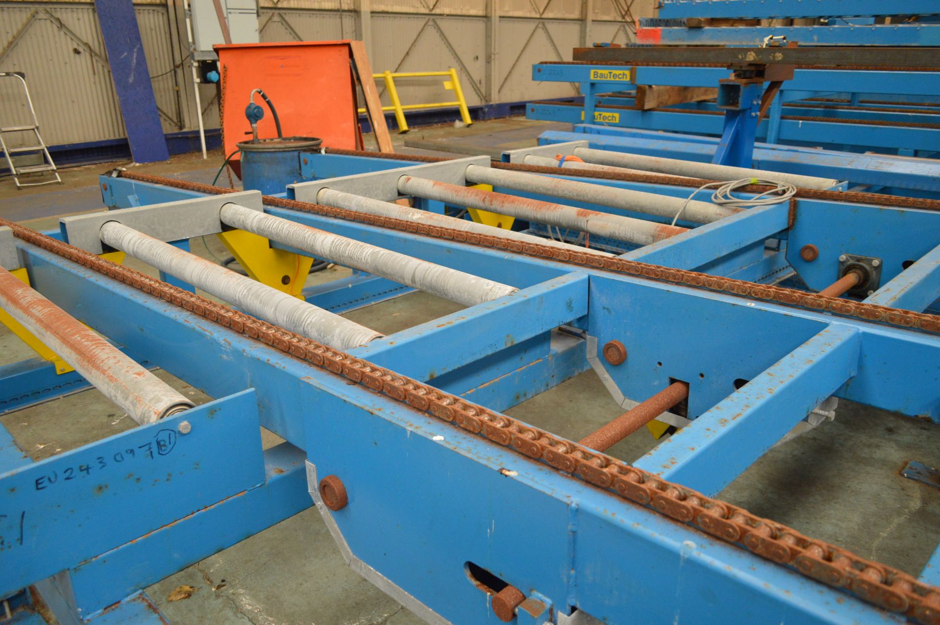 Two BauTech Cross Conveyors, each with powered roller conveyor, 1.33m ...