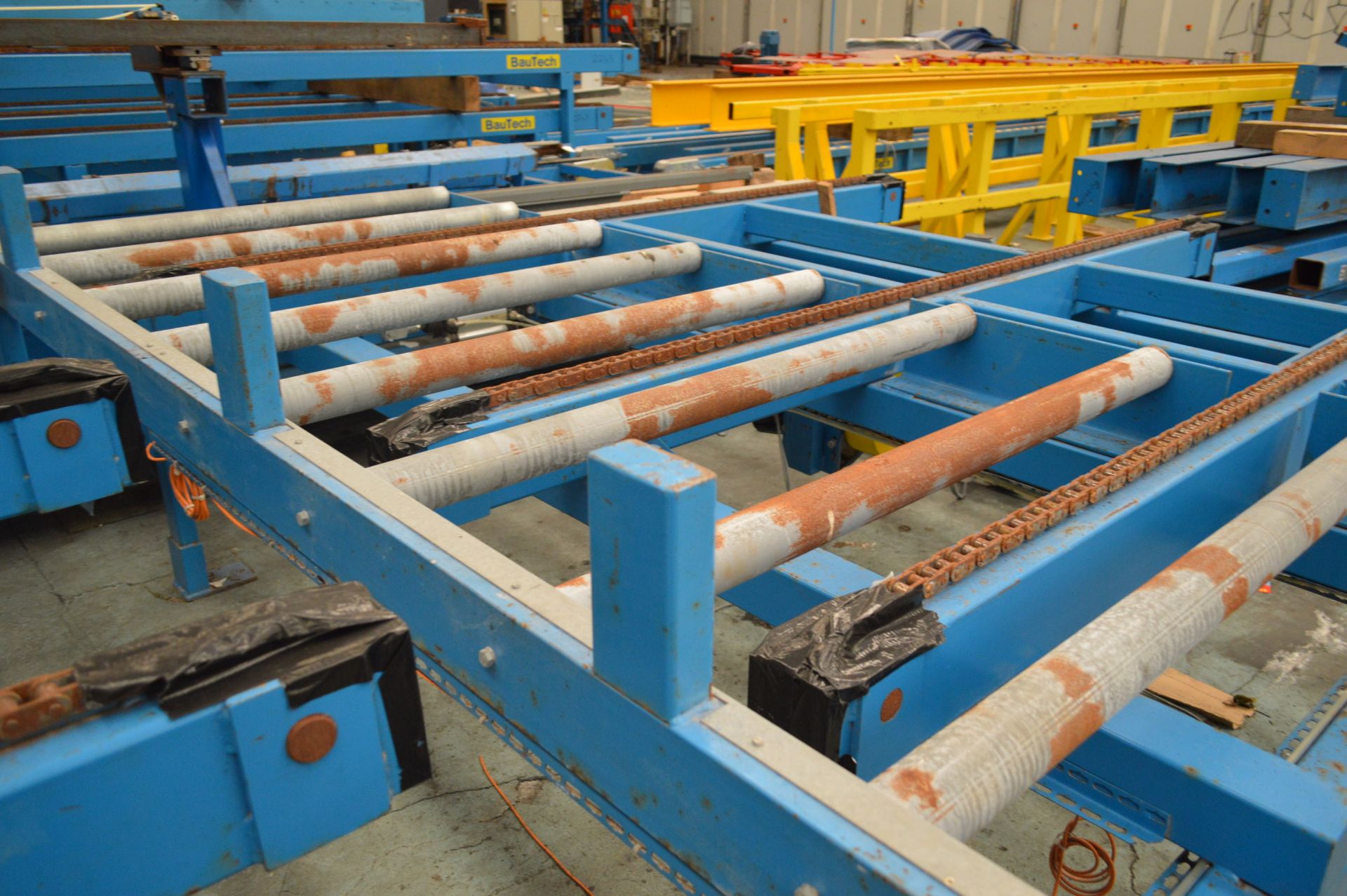 Two BauTech Cross Conveyors, each with powered roller conveyor, 1.33m ...