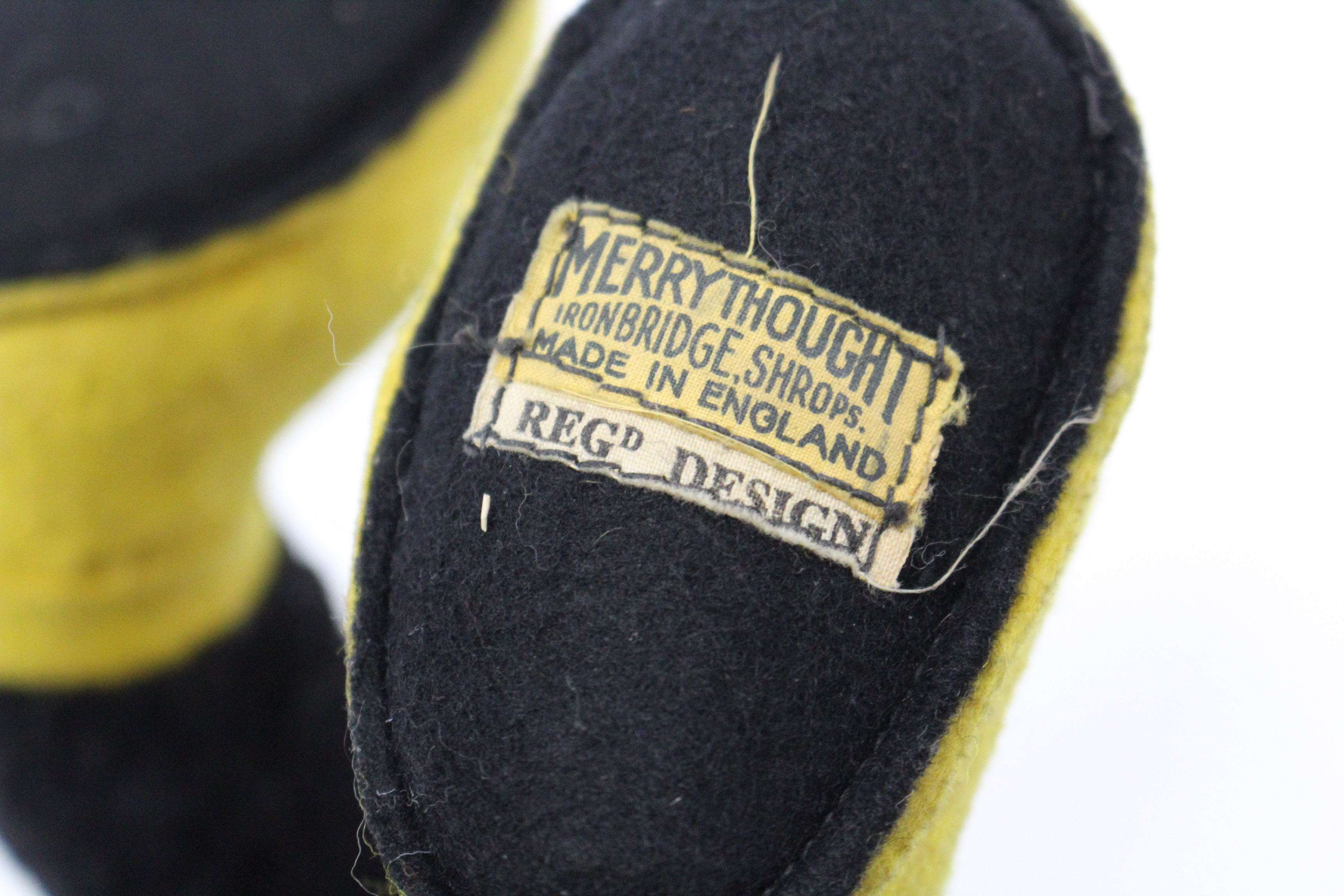 A mid-20th century Merrythought “Mickey Mouse” soft toy, 13” high.