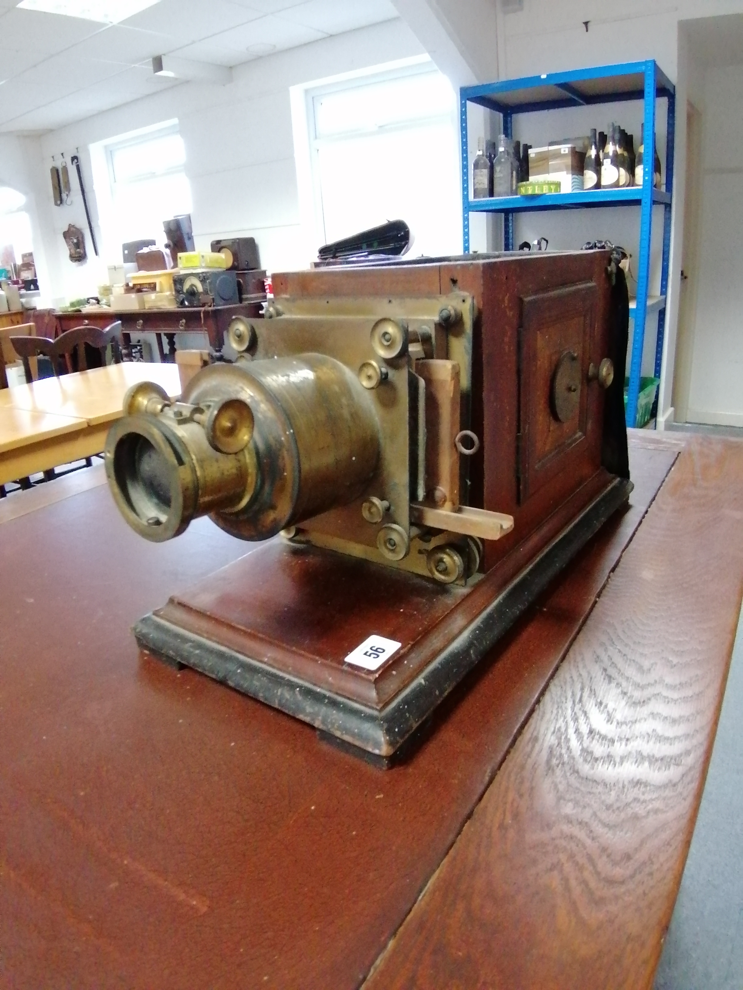 A Victorian mahogany magic lantern with brass fittings, 18” long ...