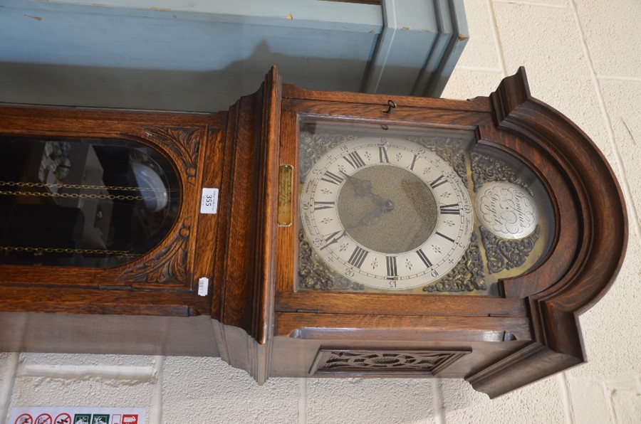 An oak 'Renown' oak longcase clock, Bravingtons Ltd., London