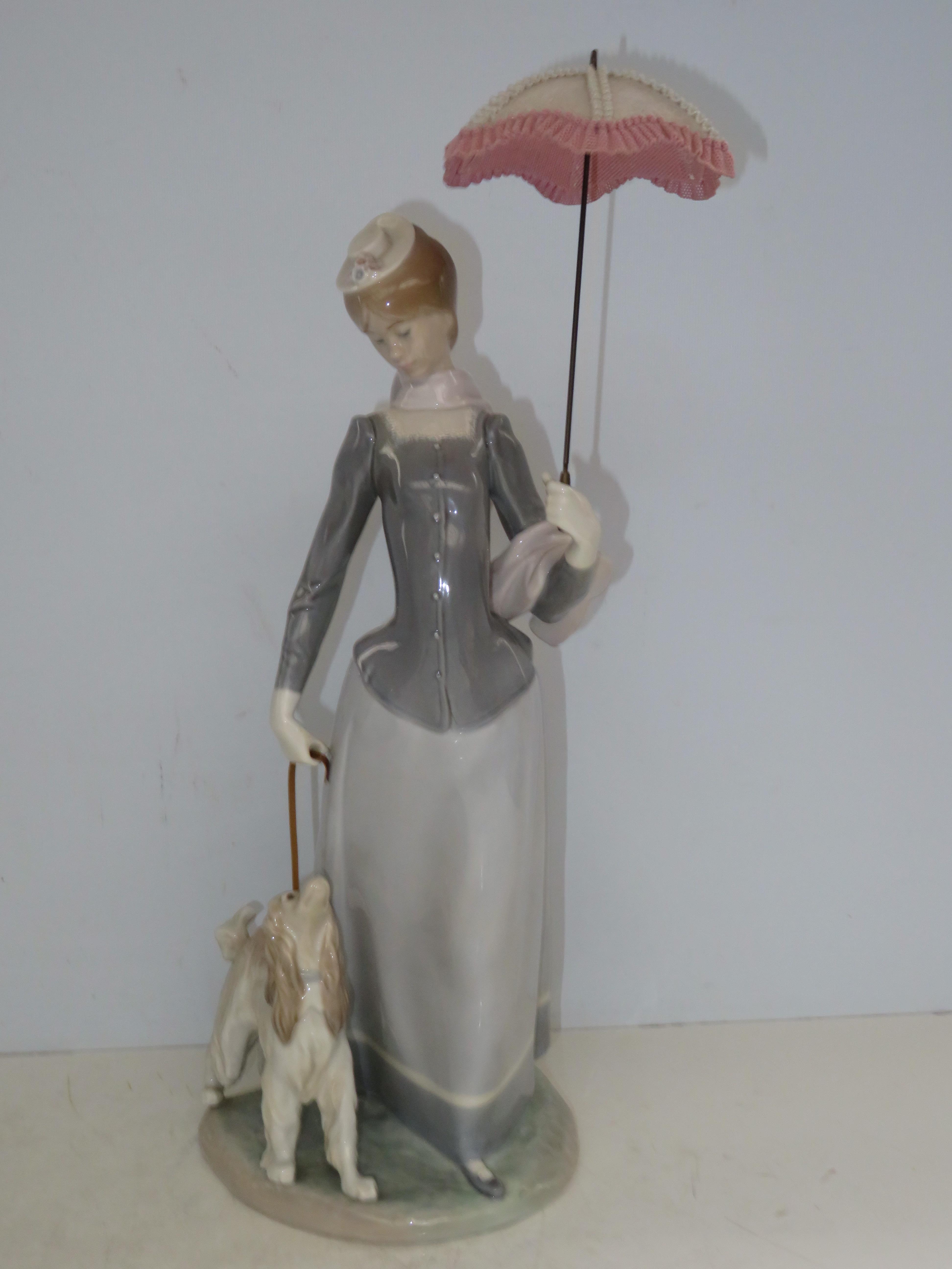 Large Lladro Figure Of A Lady With A Spaniel And Umbrella 44cm