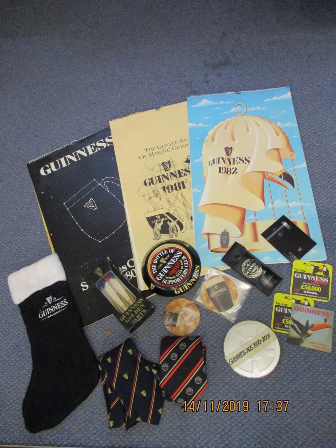 Three Guinness calendar's 1980- 1982 and other Guinness advertising items