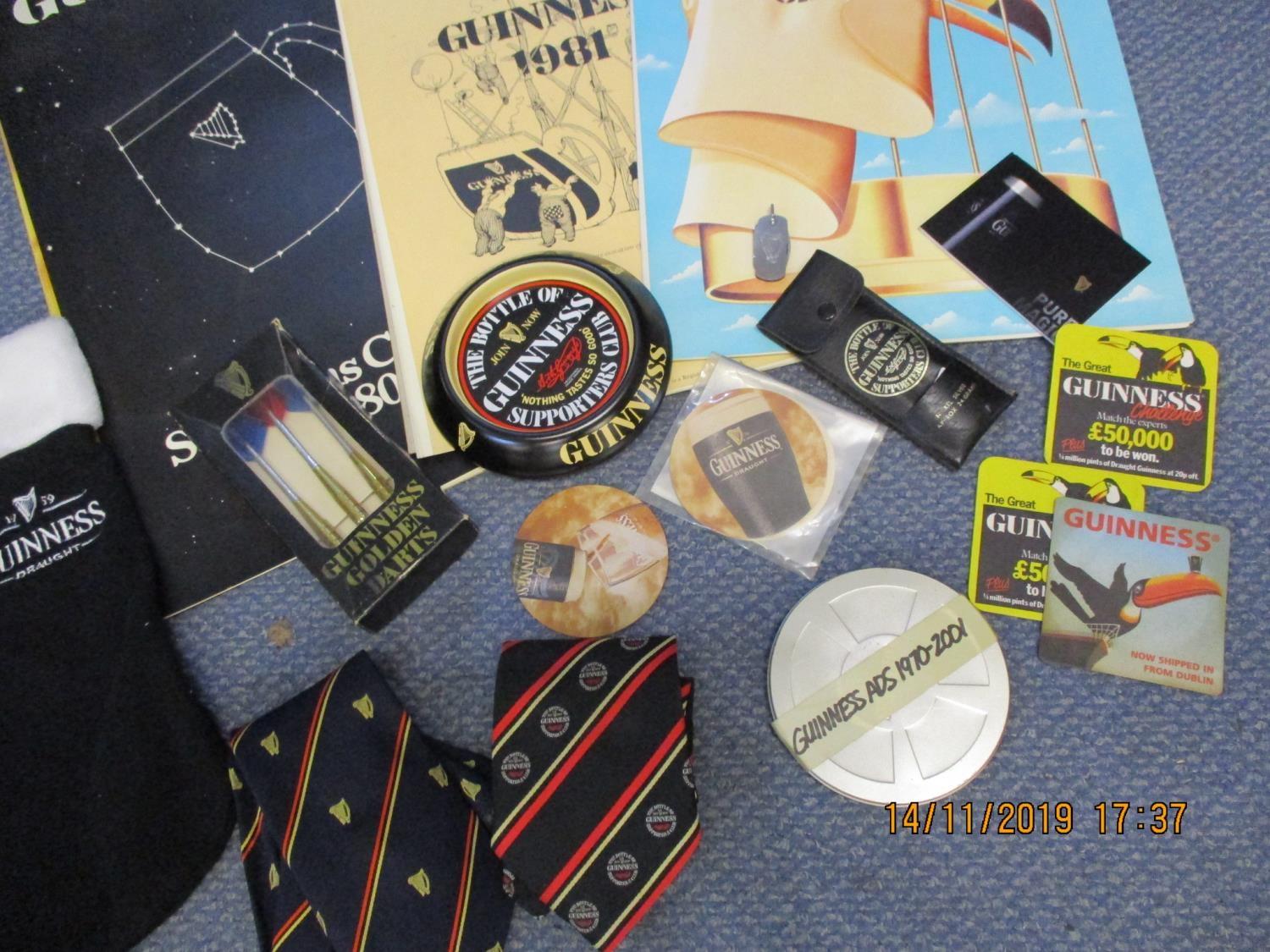 Three Guinness calendar's 1980- 1982 and other Guinness advertising items