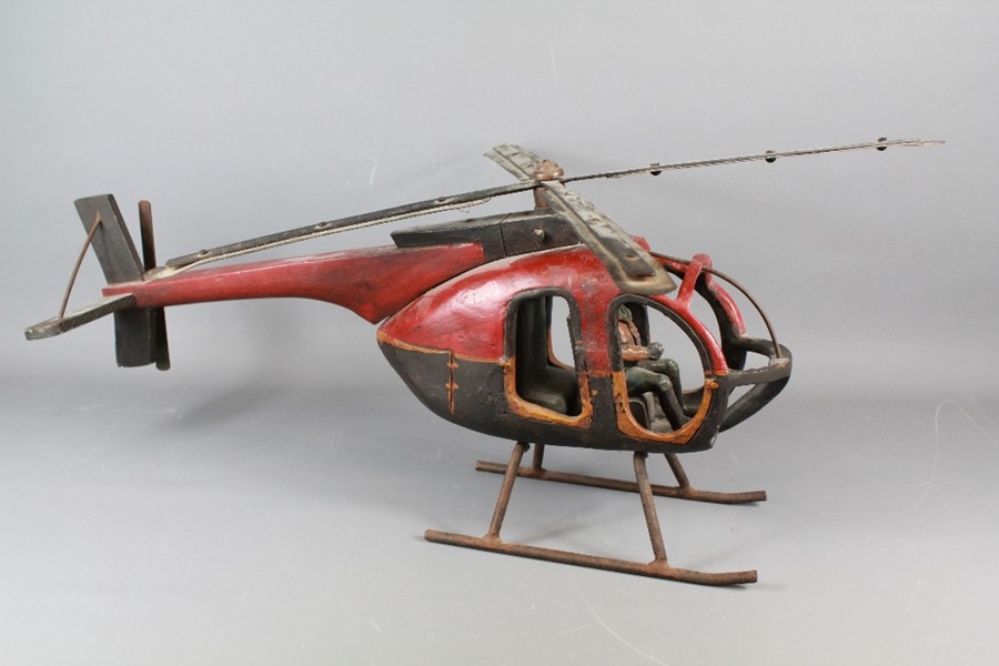 A Hand Made Wood Carved Helicopter. The helicopter with metal rotors ...