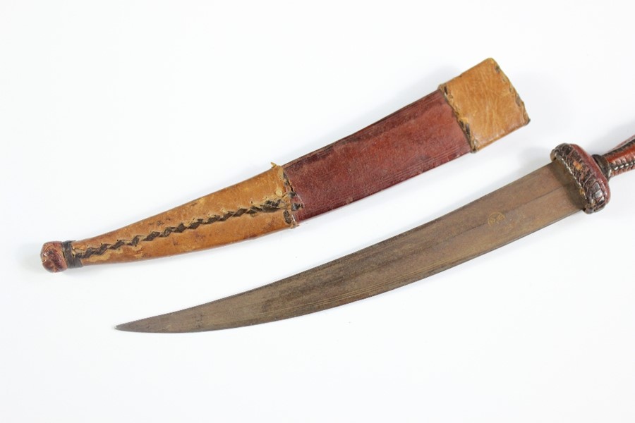 A North African Curved Dagger; single blade (fullered) approx 17.5 cms ...