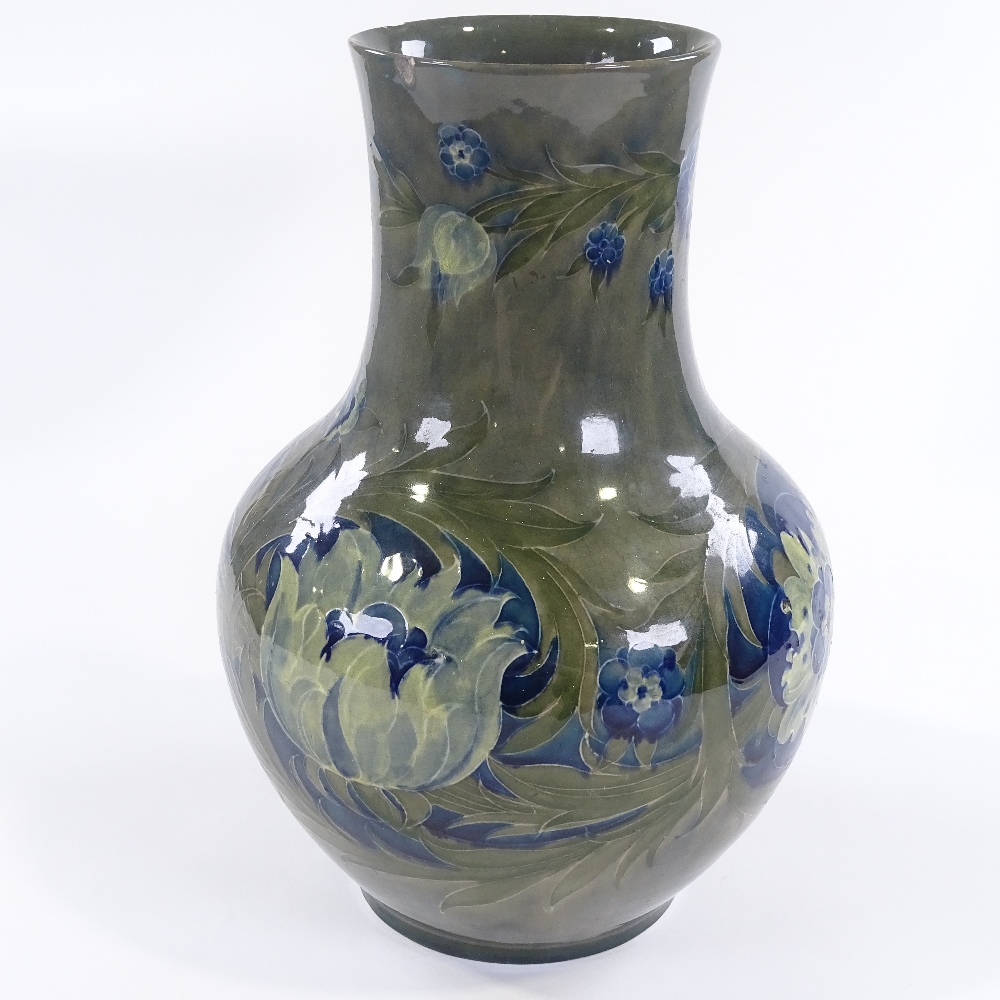 A Moorcroft Pottery baluster vase circa 1900, spring flower designs ...