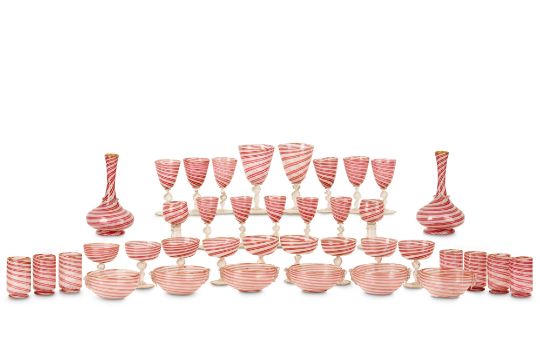 A SUITE OF VENETIAN LATTICINIO SWIRL GLASSWARE, late 19th or early 20th ...