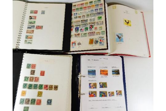 Five stamp albums including New Zealand & World