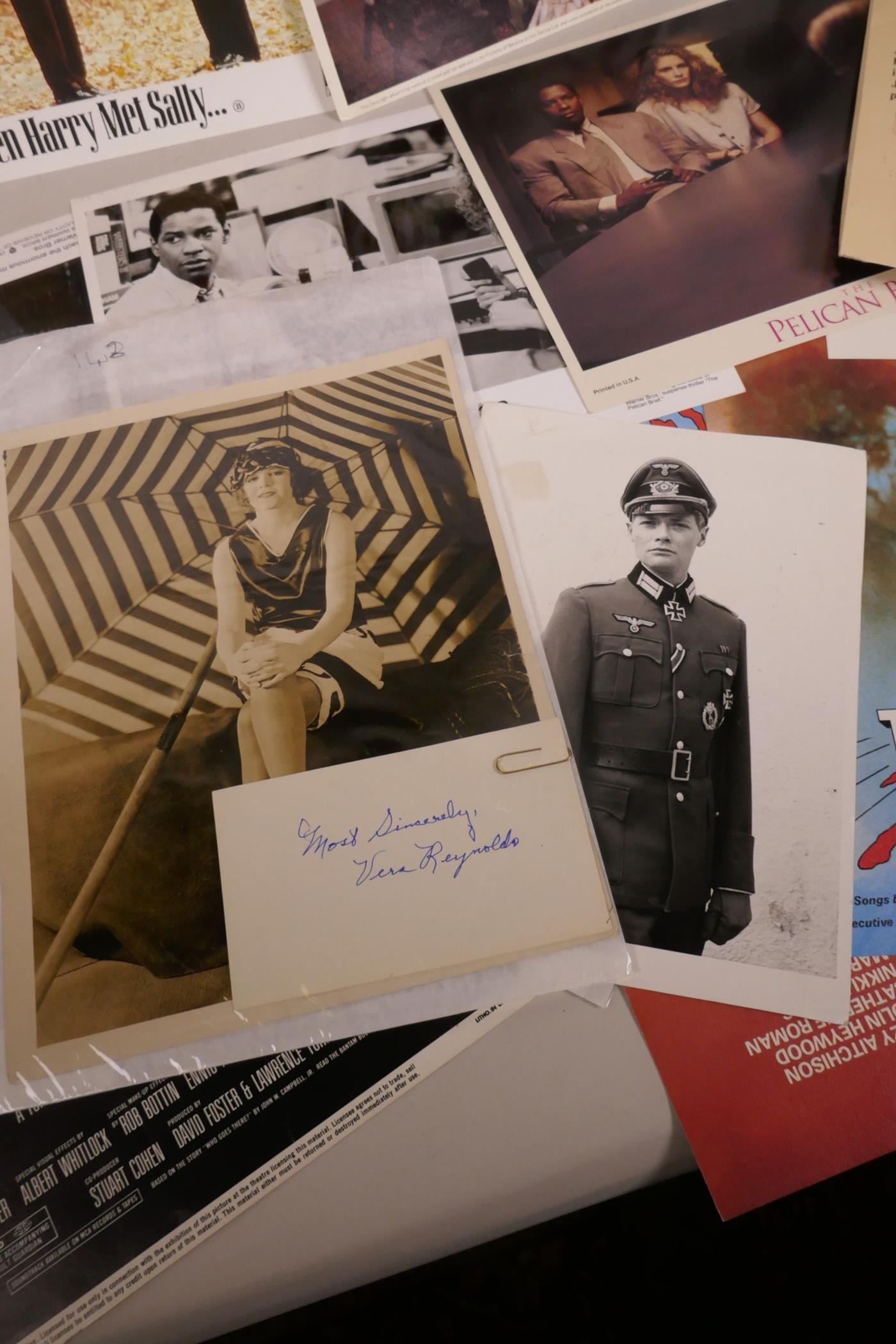 A collection of movie and theatre memorabilia including signed posters ...