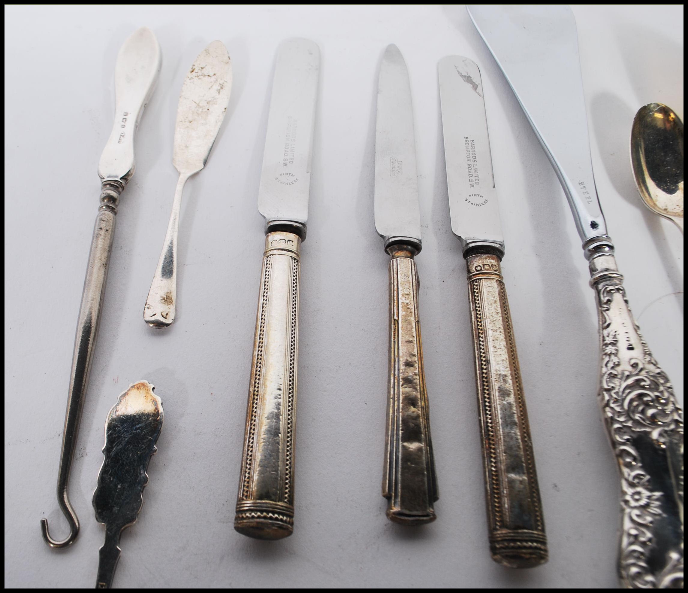 A collection of silver hallmarked flatware to include George Howson for ...
