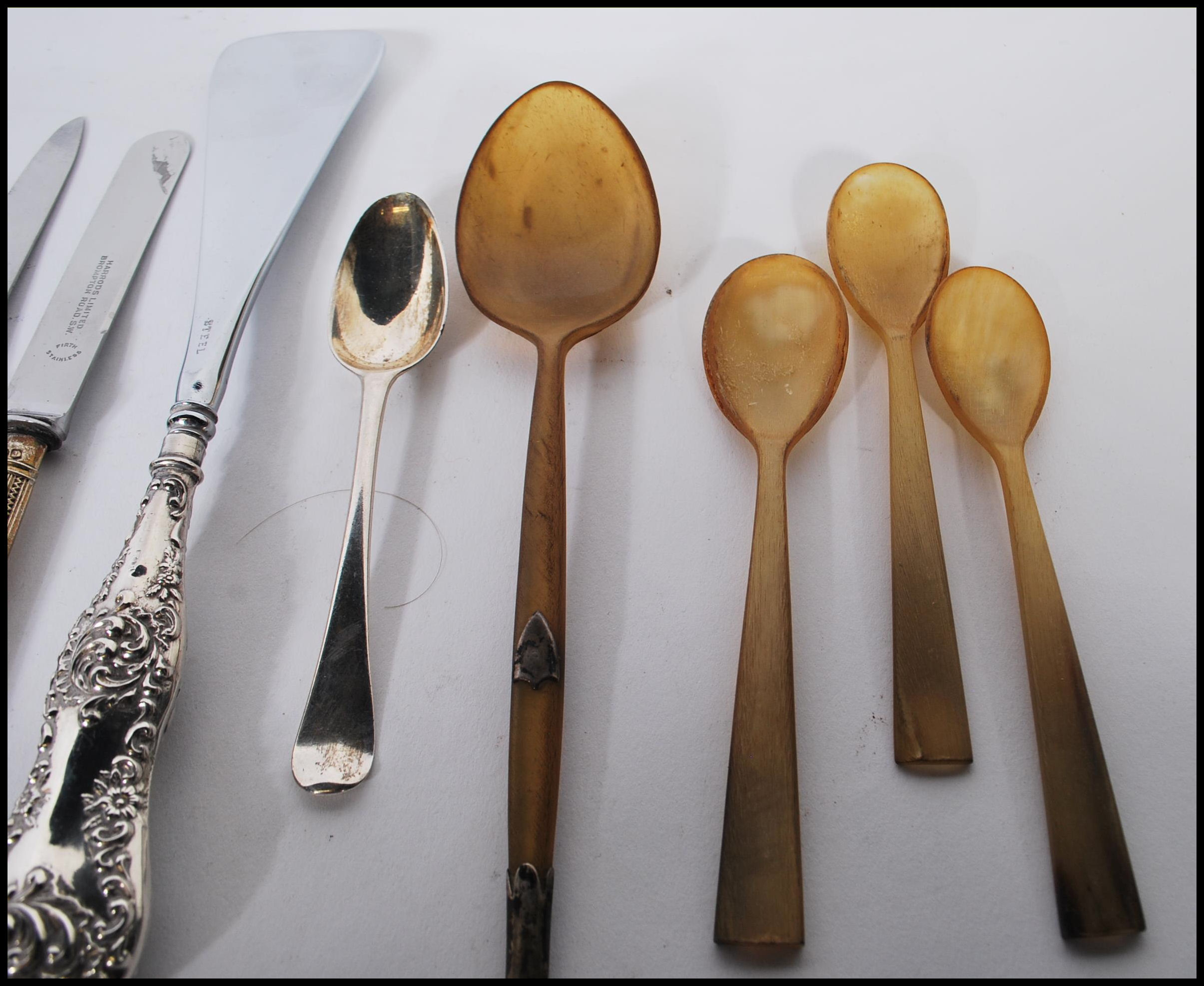 A collection of silver hallmarked flatware to include George Howson for ...