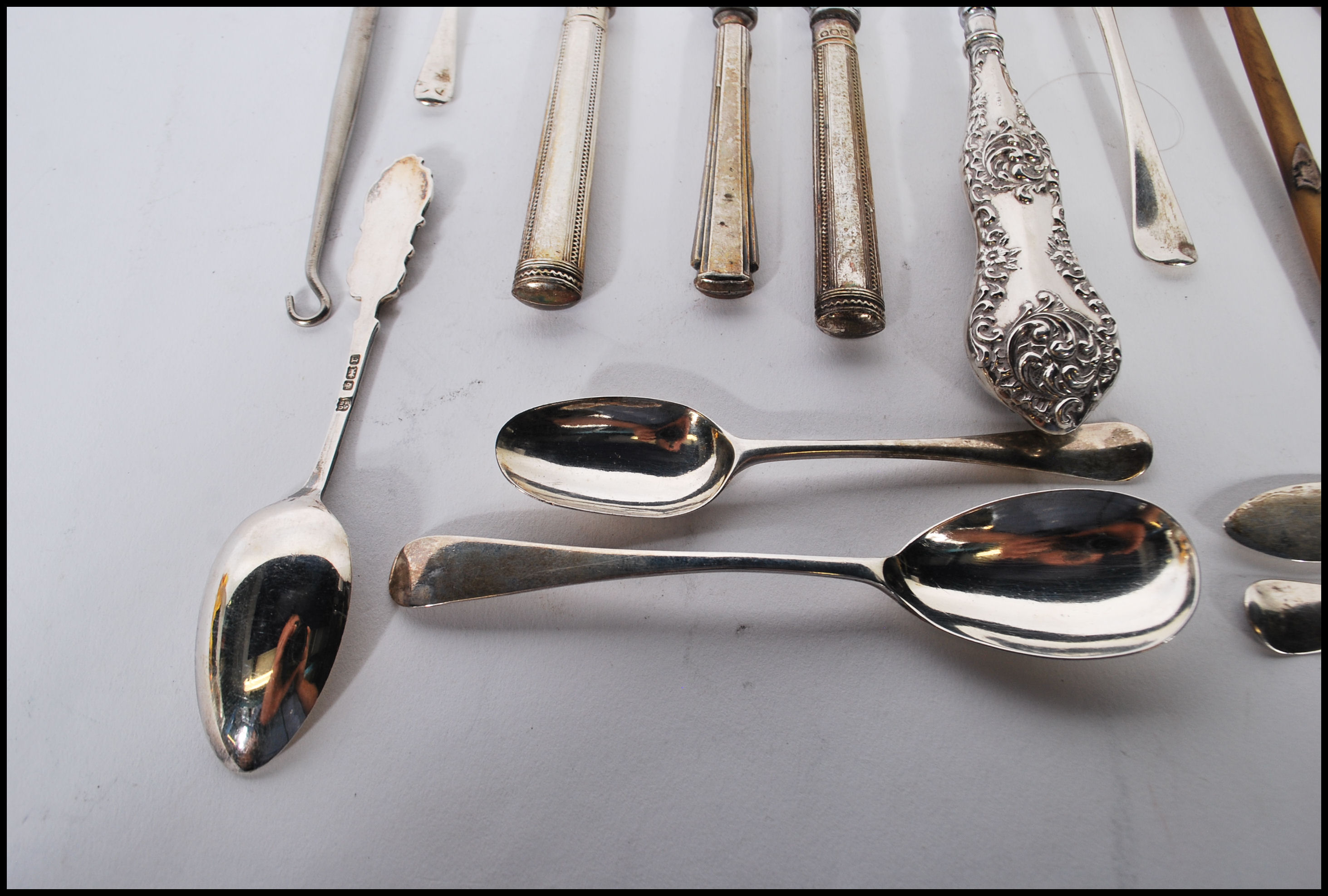A collection of silver hallmarked flatware to include George Howson for ...