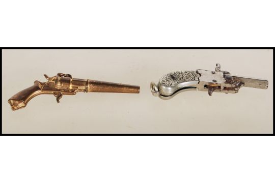 A 19th Century German miniature firing cap gun / pistol having engraved ...