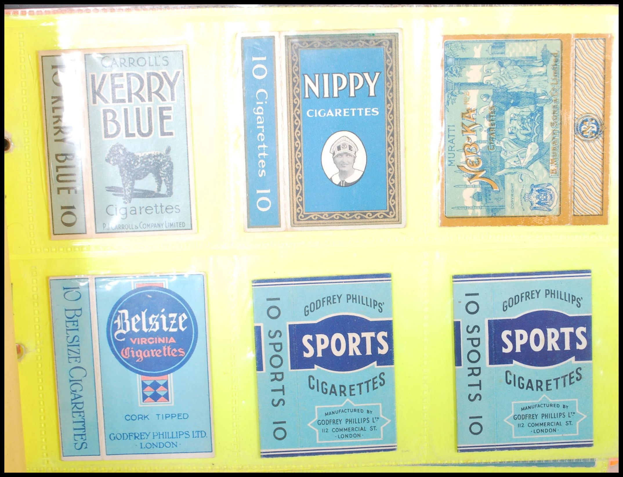 A collection of vintage 20th Century cigarette boxes over three albums ...