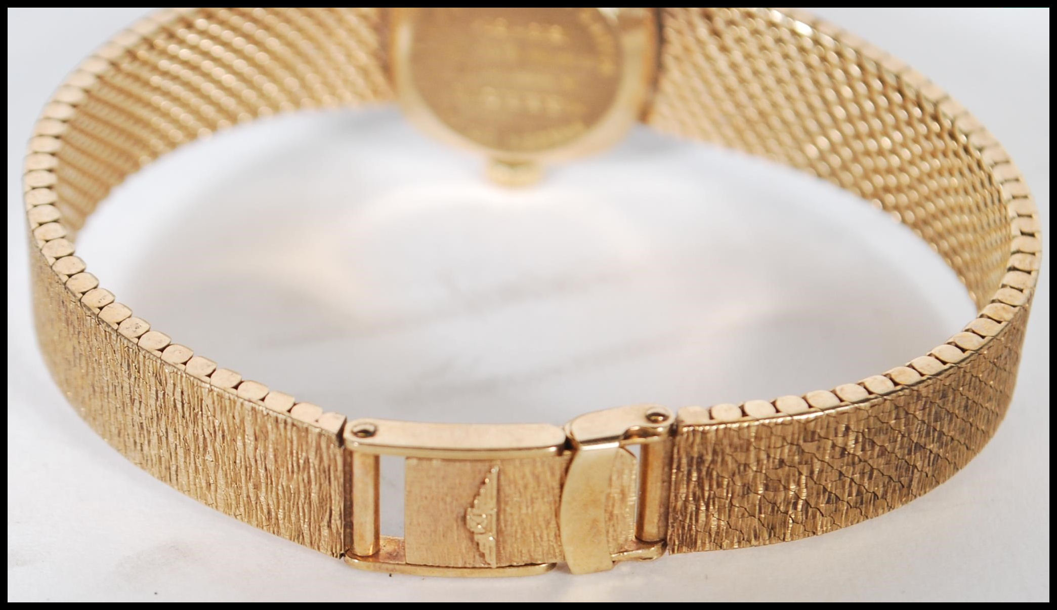 A vintage 9ct gold 1970's Longines ladies cocktail watch having a ...