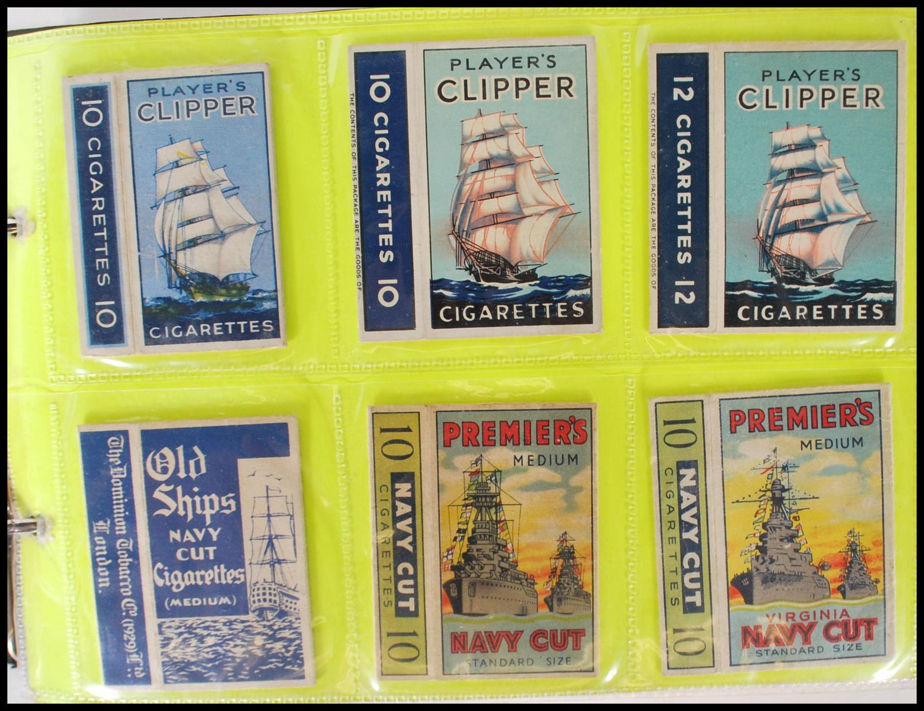 A collection of vintage 20th Century cigarette boxes over three albums ...