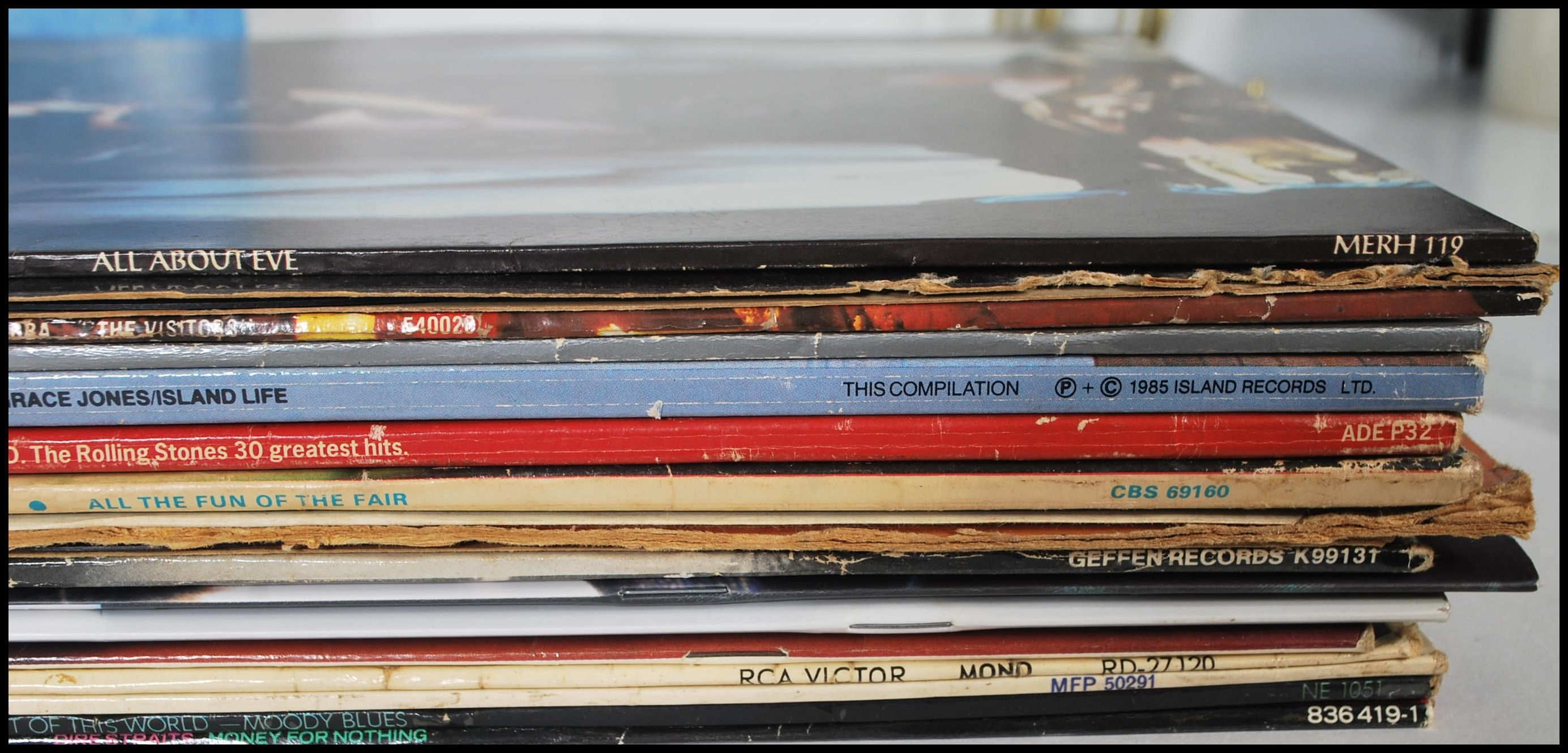 A collection of vinyl long play LP vinyl record albums and 45rpm 7 ...