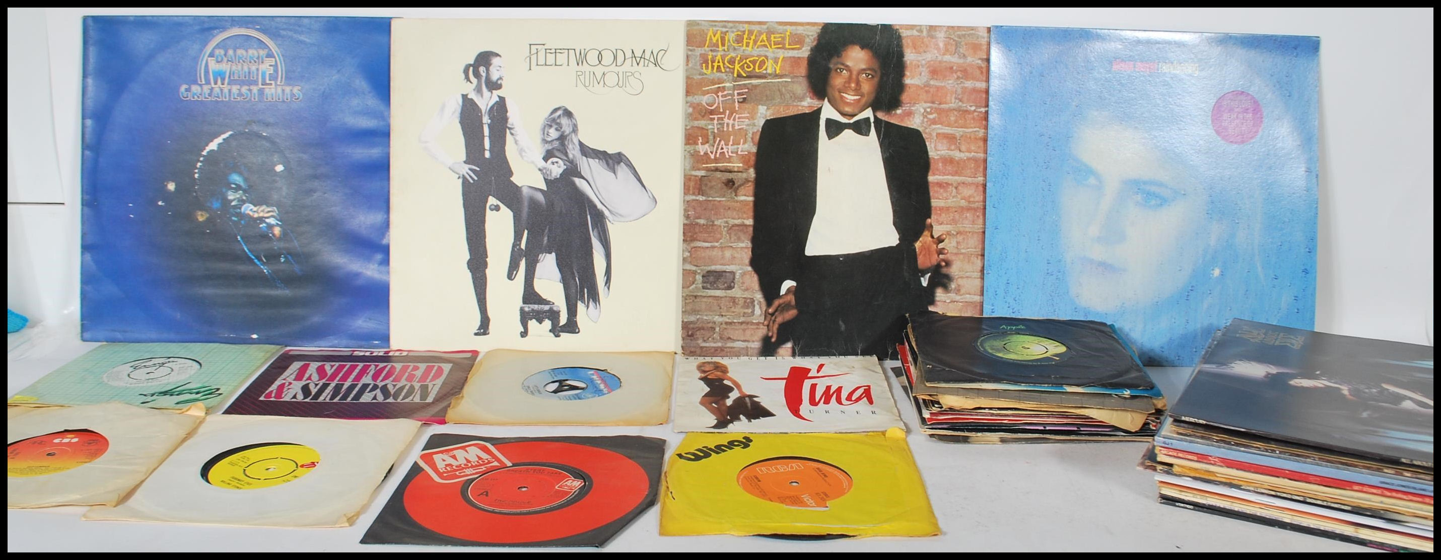 A collection of vinyl long play LP vinyl record albums and 45rpm 7 ...