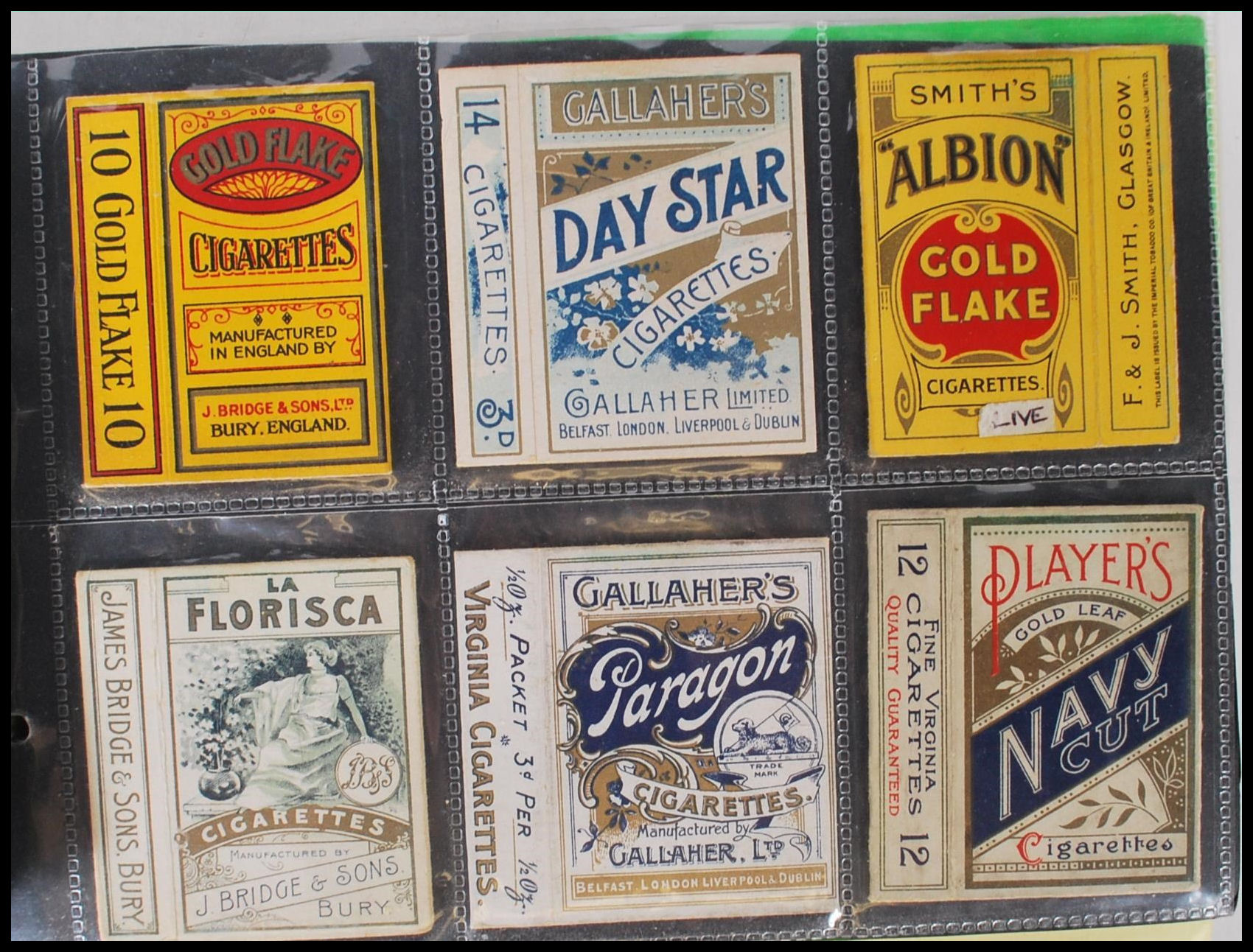 A collection of vintage 20th Century cigarette boxes over three albums ...