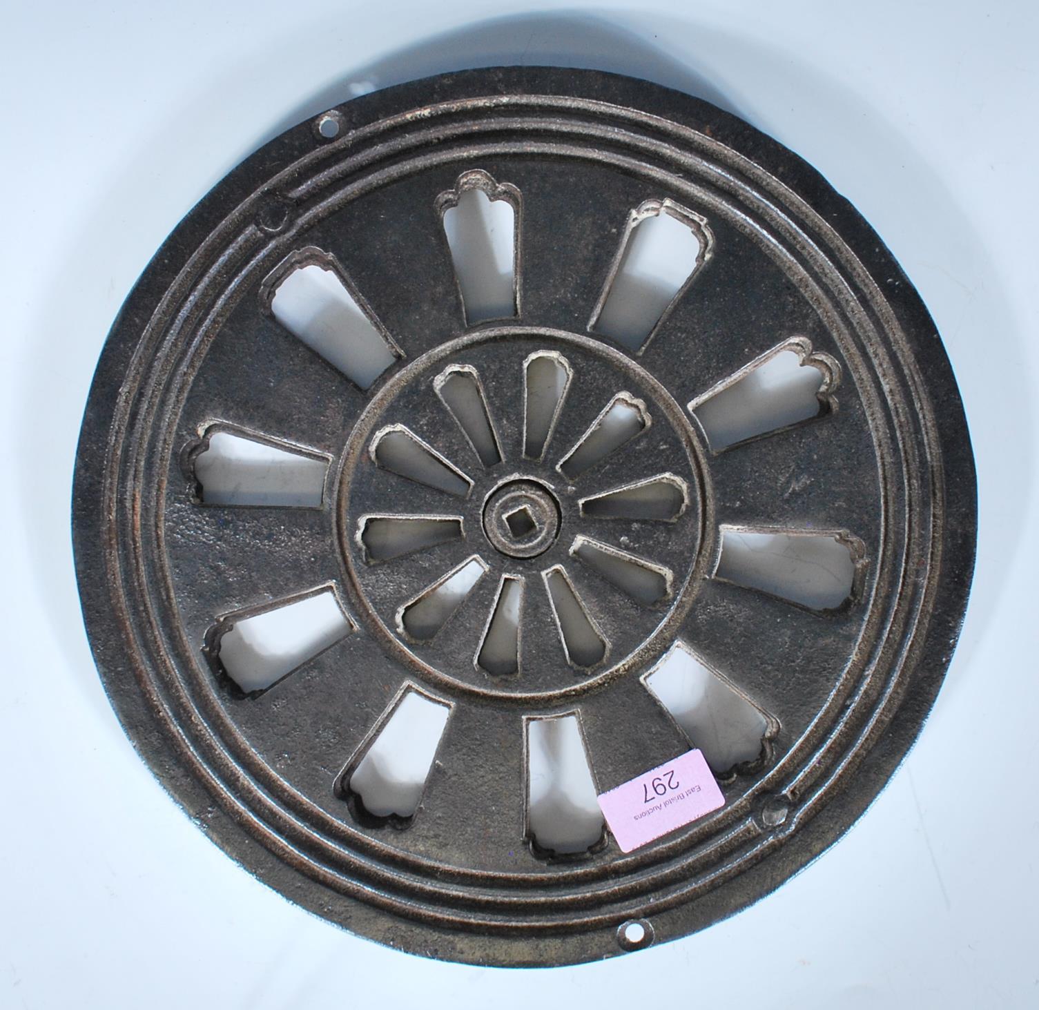 A 19th Century Victorian cast iron wall mounted air vent of round form ...