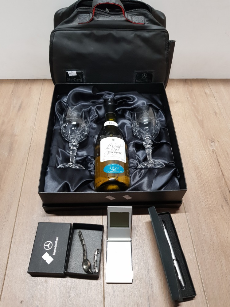 A PAIR OF MERCEDES BENZ WINE GLASSES A BOTTLE OF CUVEE TRAMONTANE ...