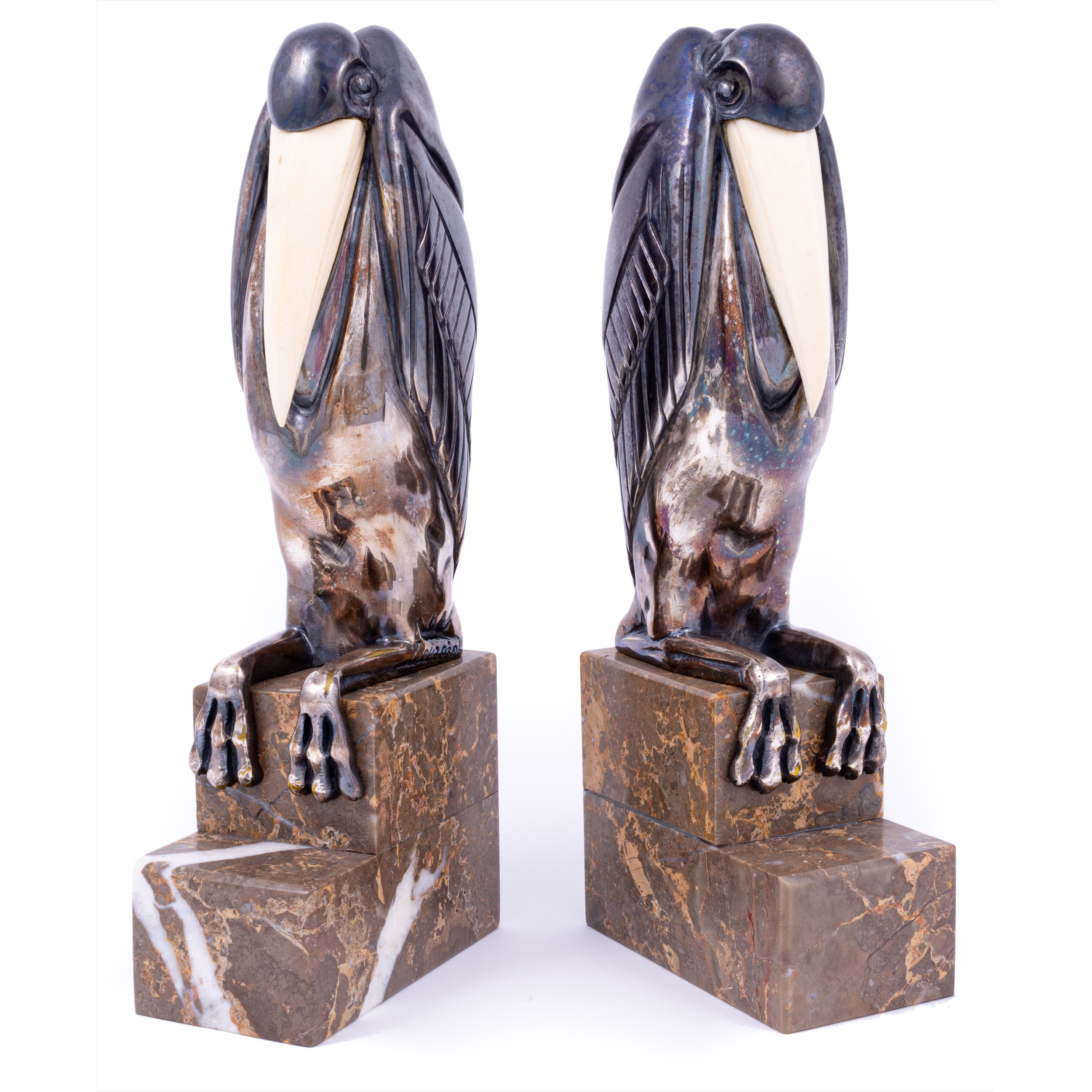 A pair of Art Deco silvered bronze and carved ivory bookends by Marcel ...