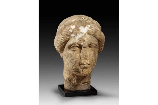Greek female head with idealized features. The lady is wearing a diadem ...