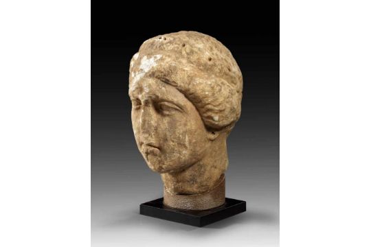 Greek female head with idealized features. The lady is wearing a diadem ...