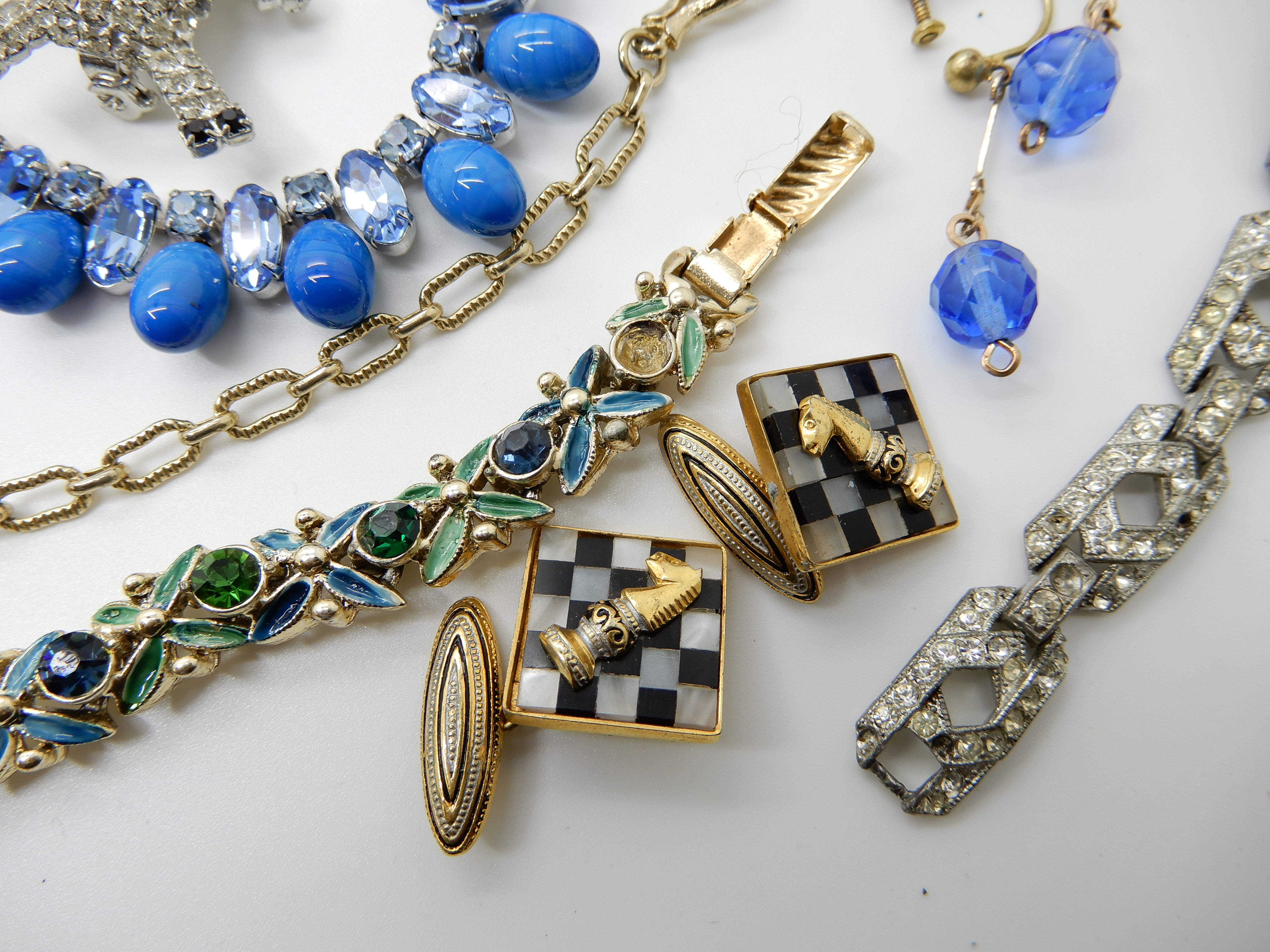 A collection of vintage costume jewellery to include, A blue glass ...