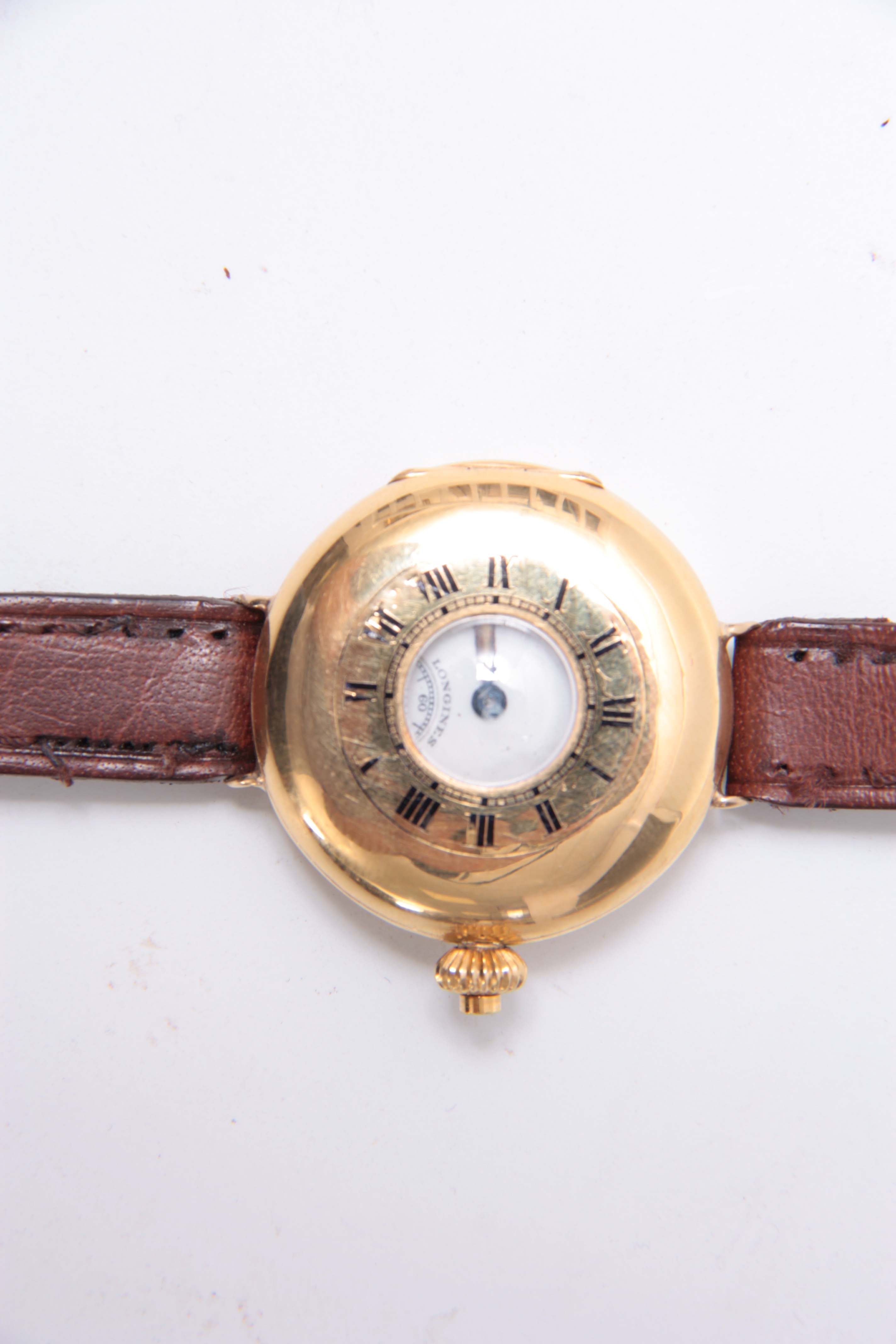LONGINES. AN EARLY 20th CENTURY 18CT GOLD HALF HUNTER WRIST WATCH ...
