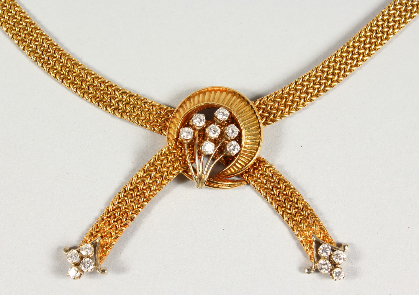 VAN CLEEF & ARPELS, A GOOD 18CT GOLD AND DIAMOND NECKLACE, with a woven ...