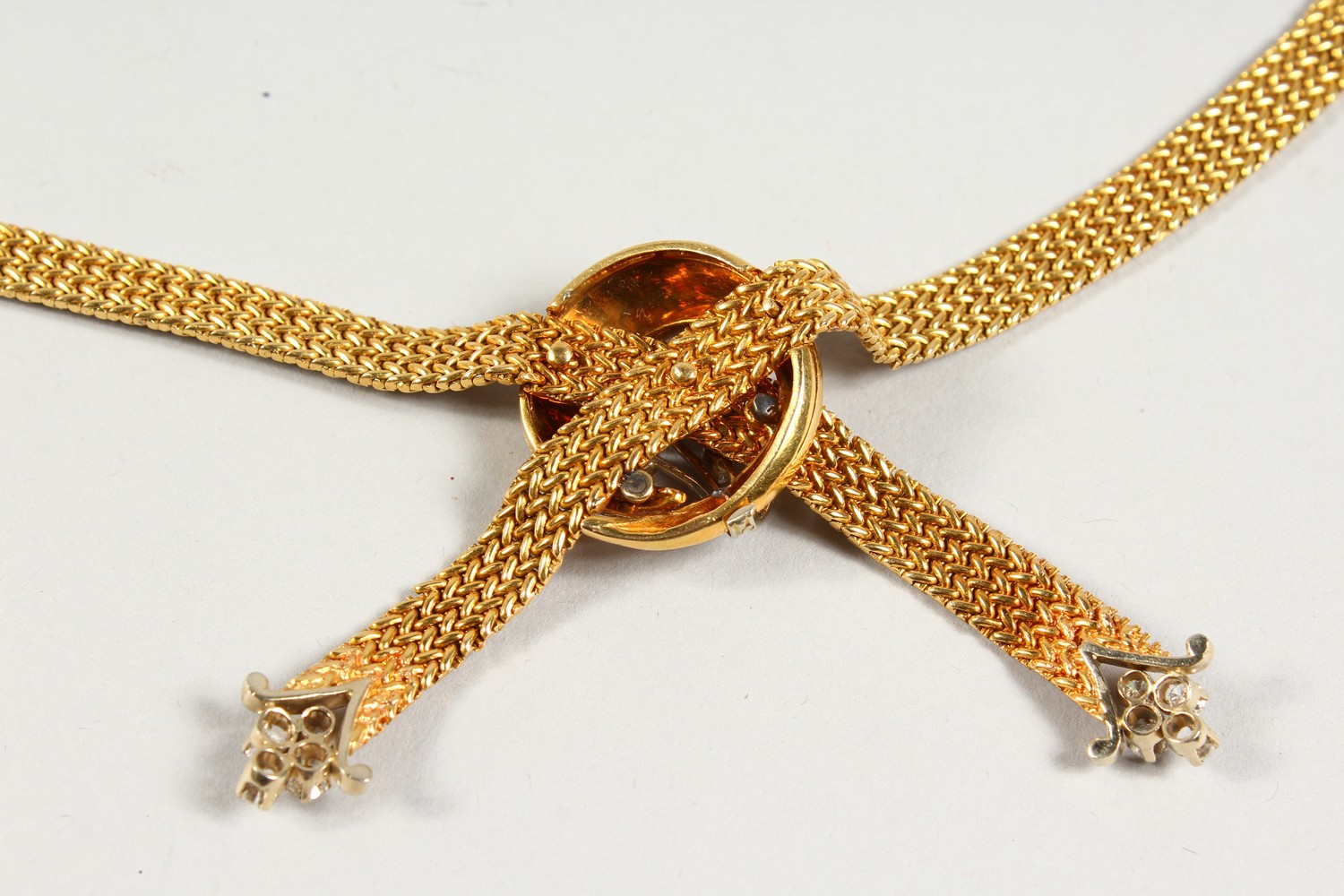 VAN CLEEF & ARPELS, A GOOD 18CT GOLD AND DIAMOND NECKLACE, with a woven ...