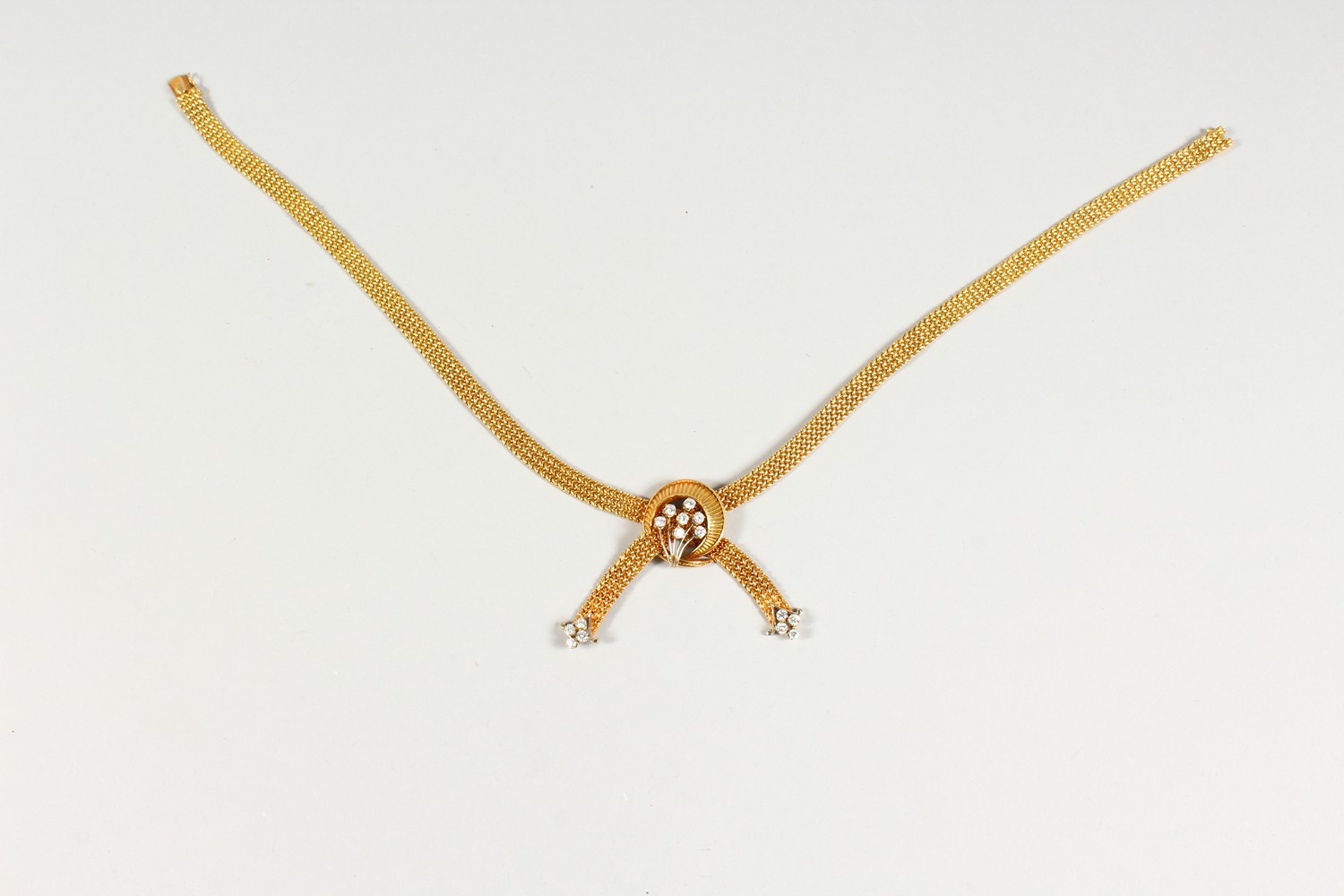 VAN CLEEF & ARPELS, A GOOD 18CT GOLD AND DIAMOND NECKLACE, with a woven ...