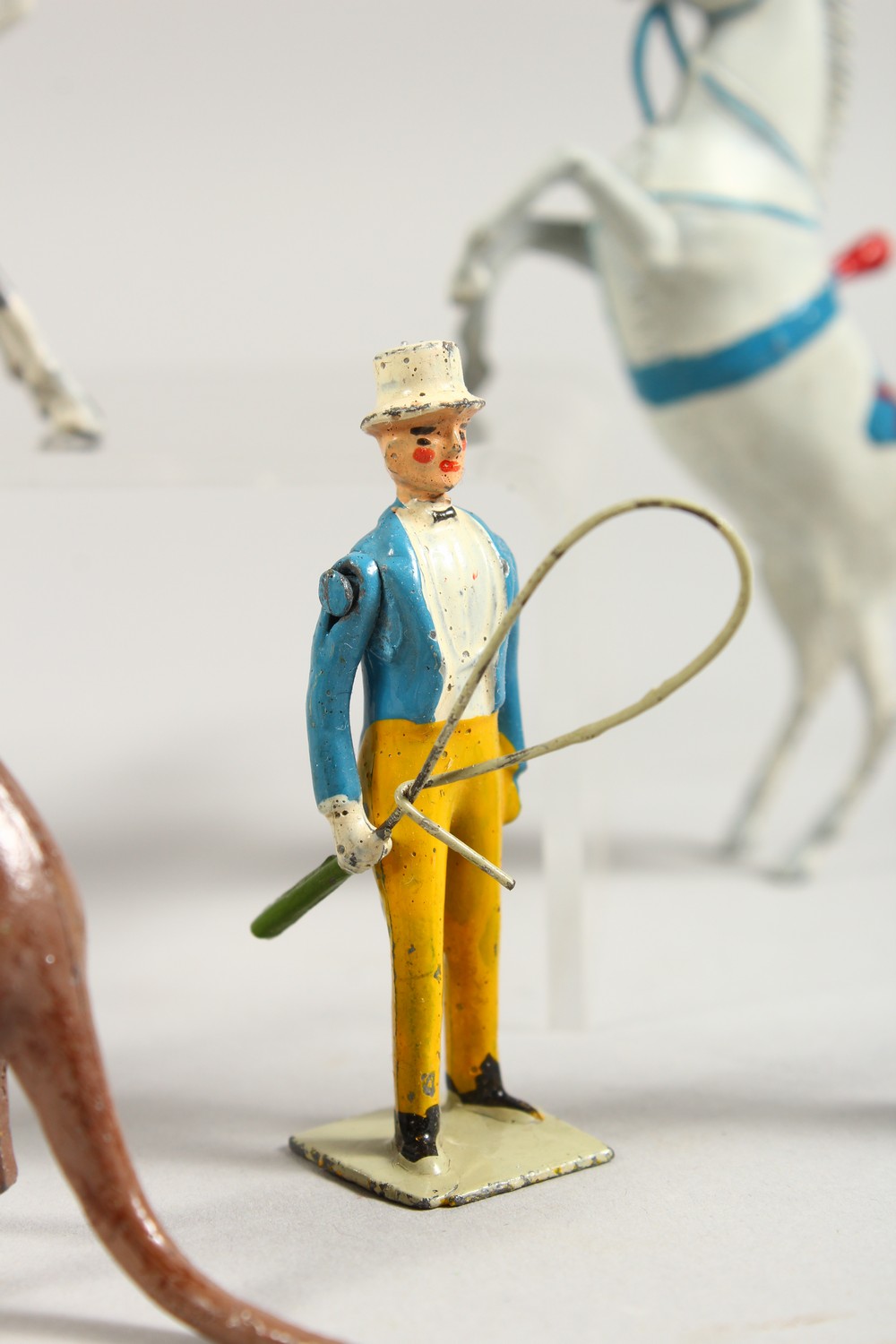 A COLLECTION OF ELEVEN BRITISH DIECAST AND PAINTED CIRCUS FIGURES ...