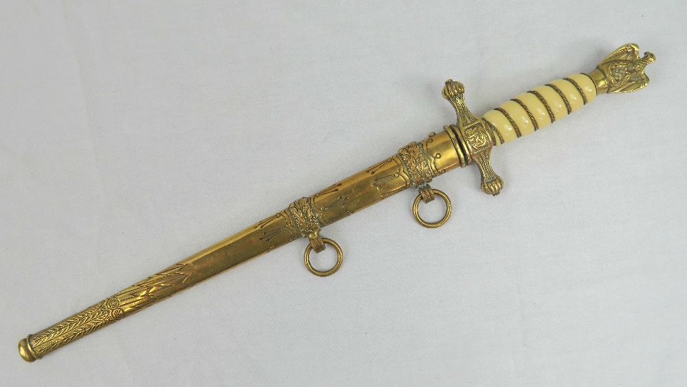 A WWII German Kriegsmarine Officers ceremonial dagger having decorative ...