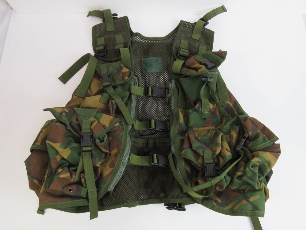 A British Military DPM camo assault vest together with a Bergan ...