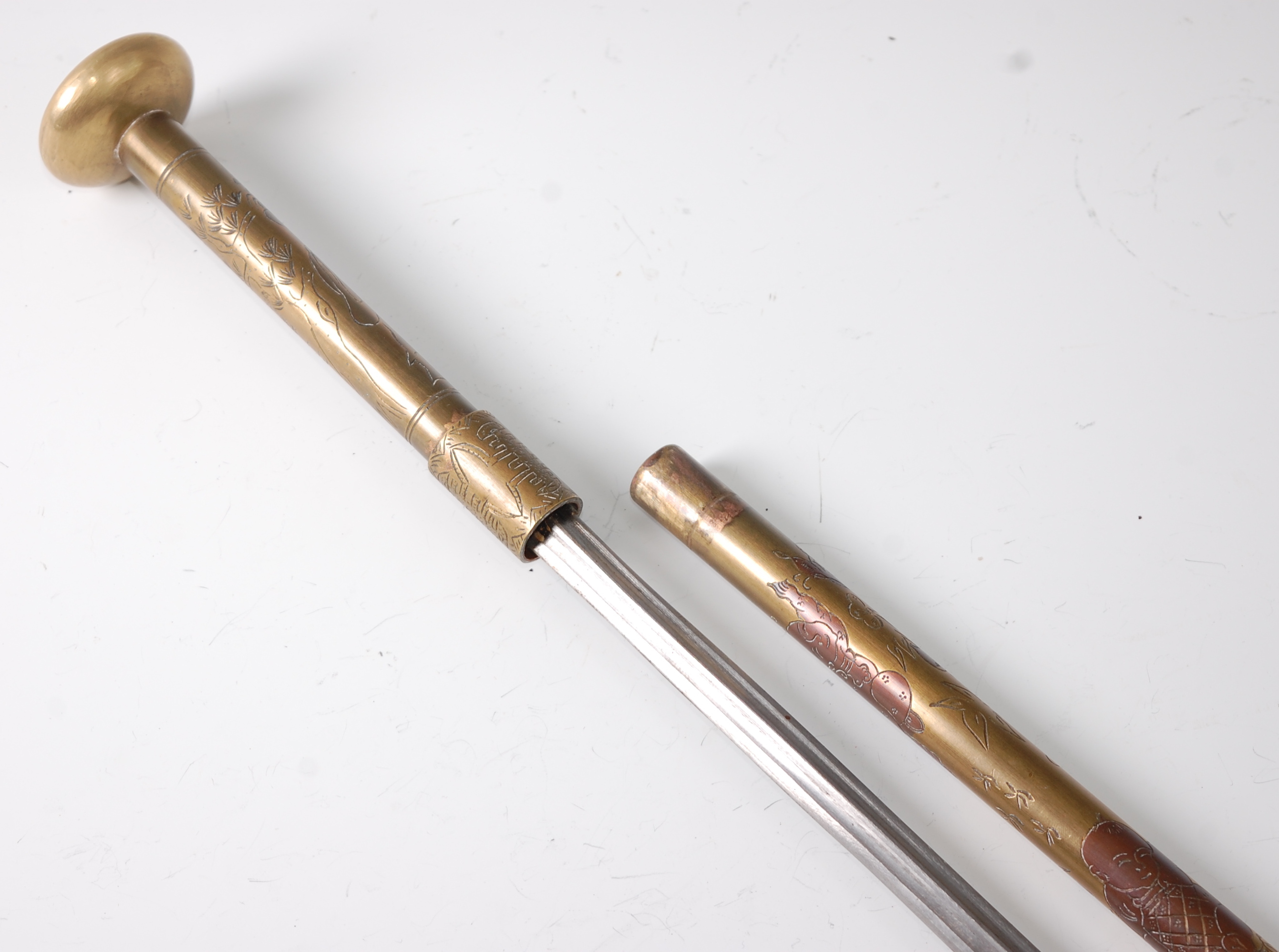 A 19th century Chinese brass and copper sword stick, having a 48cm ...
