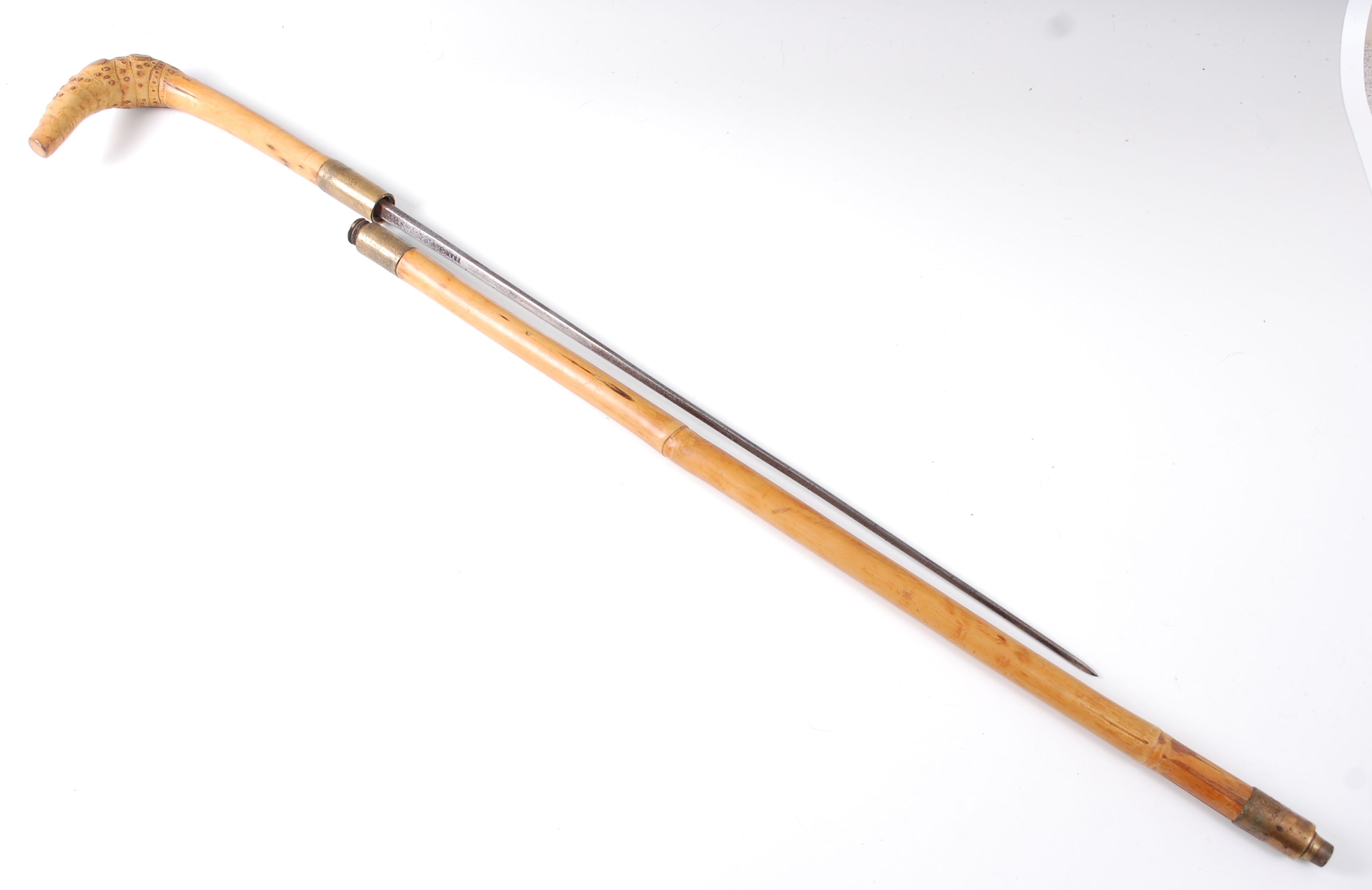 A 19th century French bamboo and brass mounted sword stick, the 52cm ...