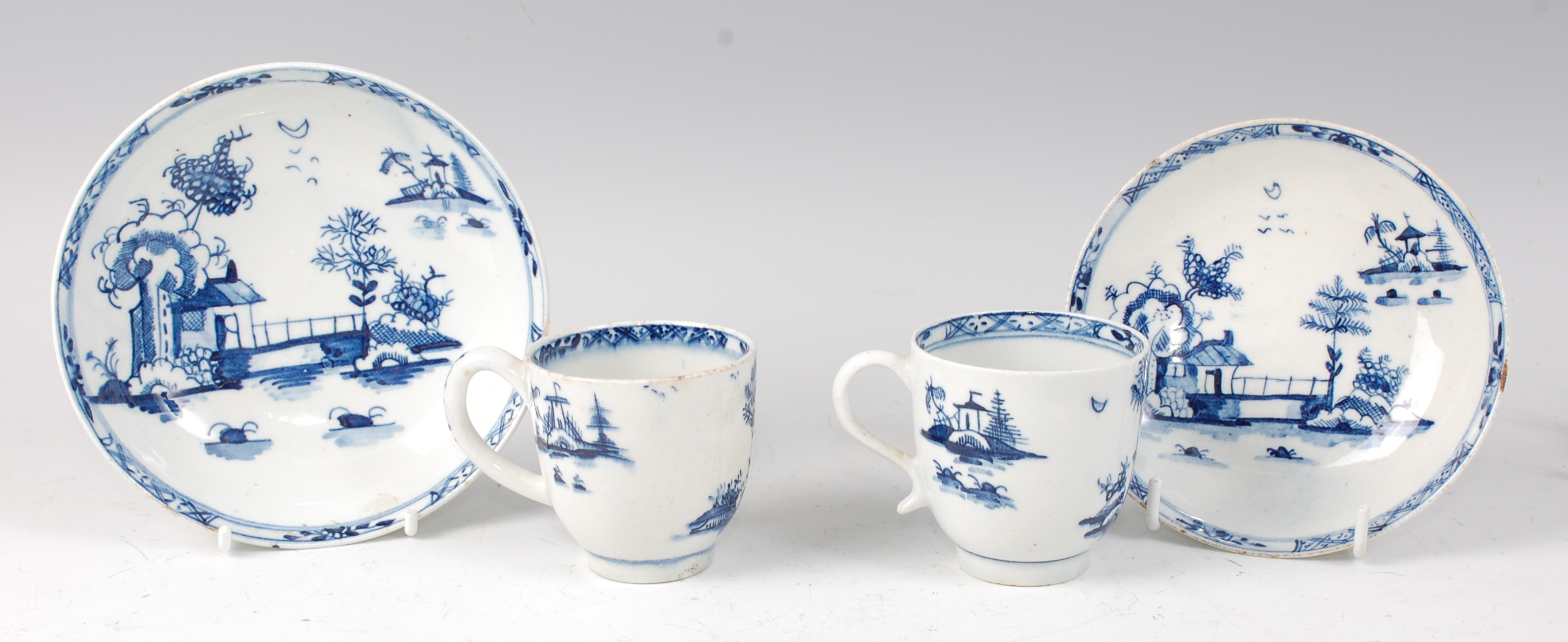 Two Lowestoft porcelain blue and white cups and saucers, circa 1770 ...