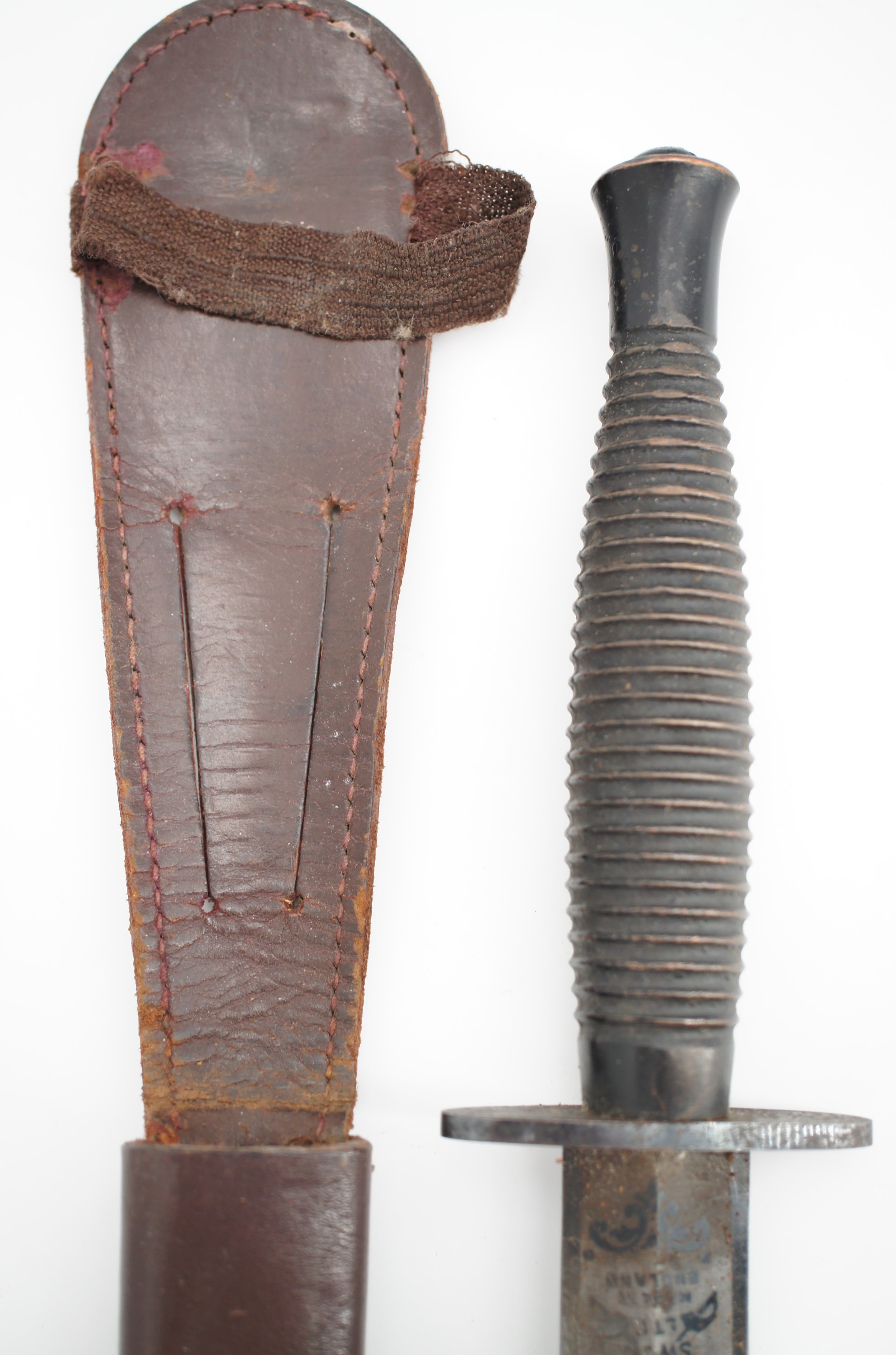 A Fairbairn Sykes / FS third pattern fighting knife, the blade bearing ...